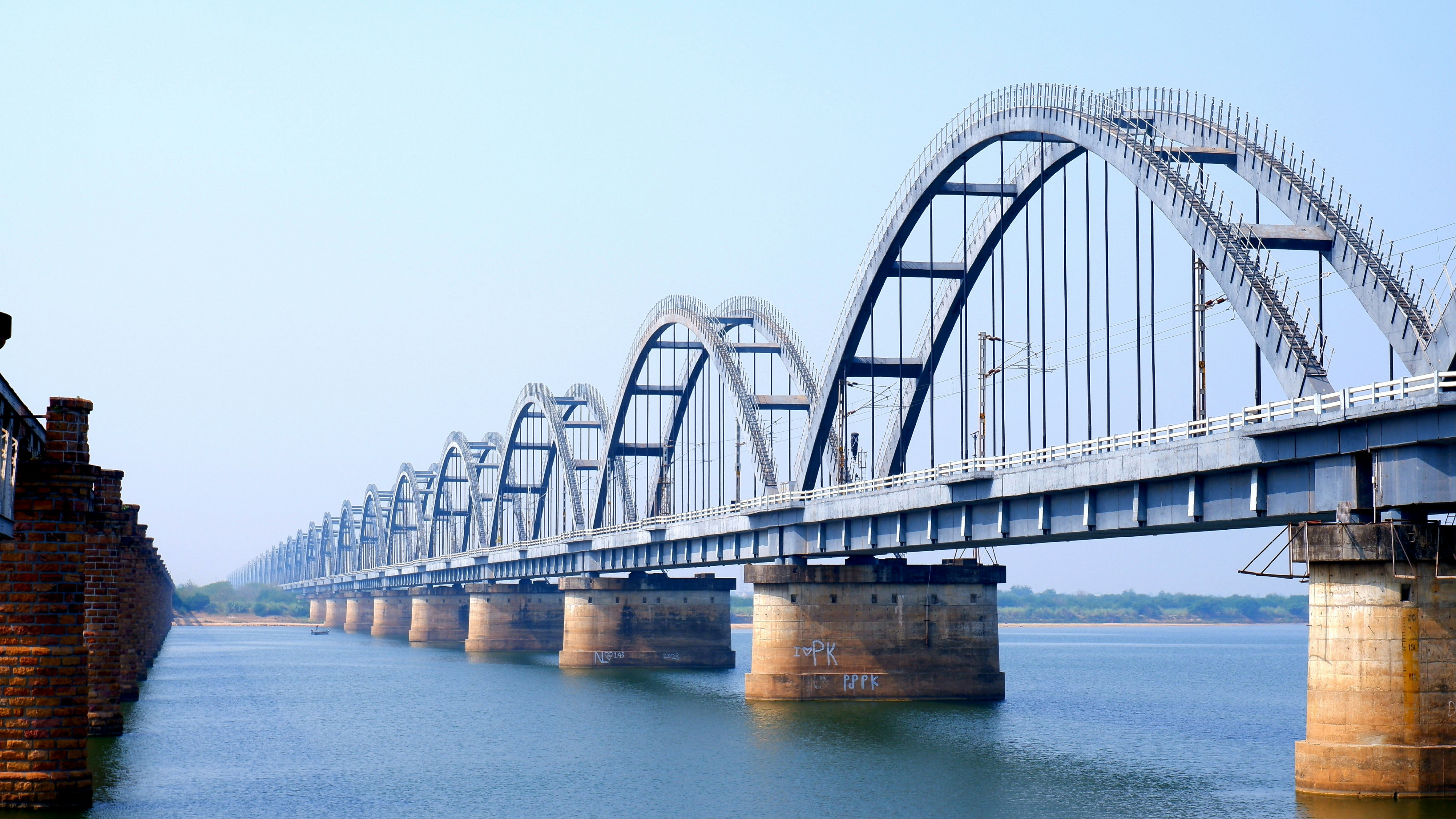 A large bridge over a large body of water photo – Free India Image on ...