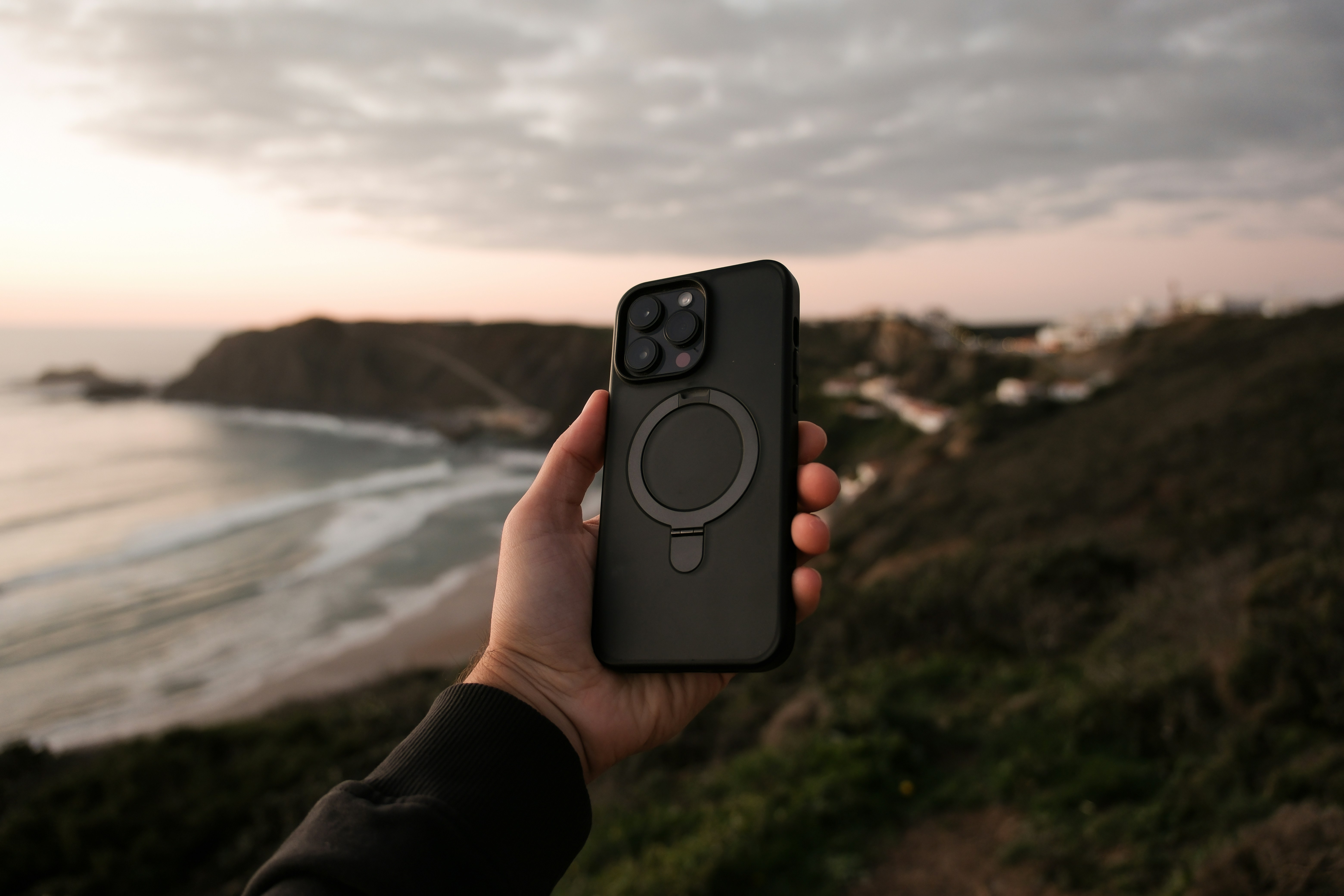 MagSafe at Sunset: Handheld Frame Over the Quiet Coast