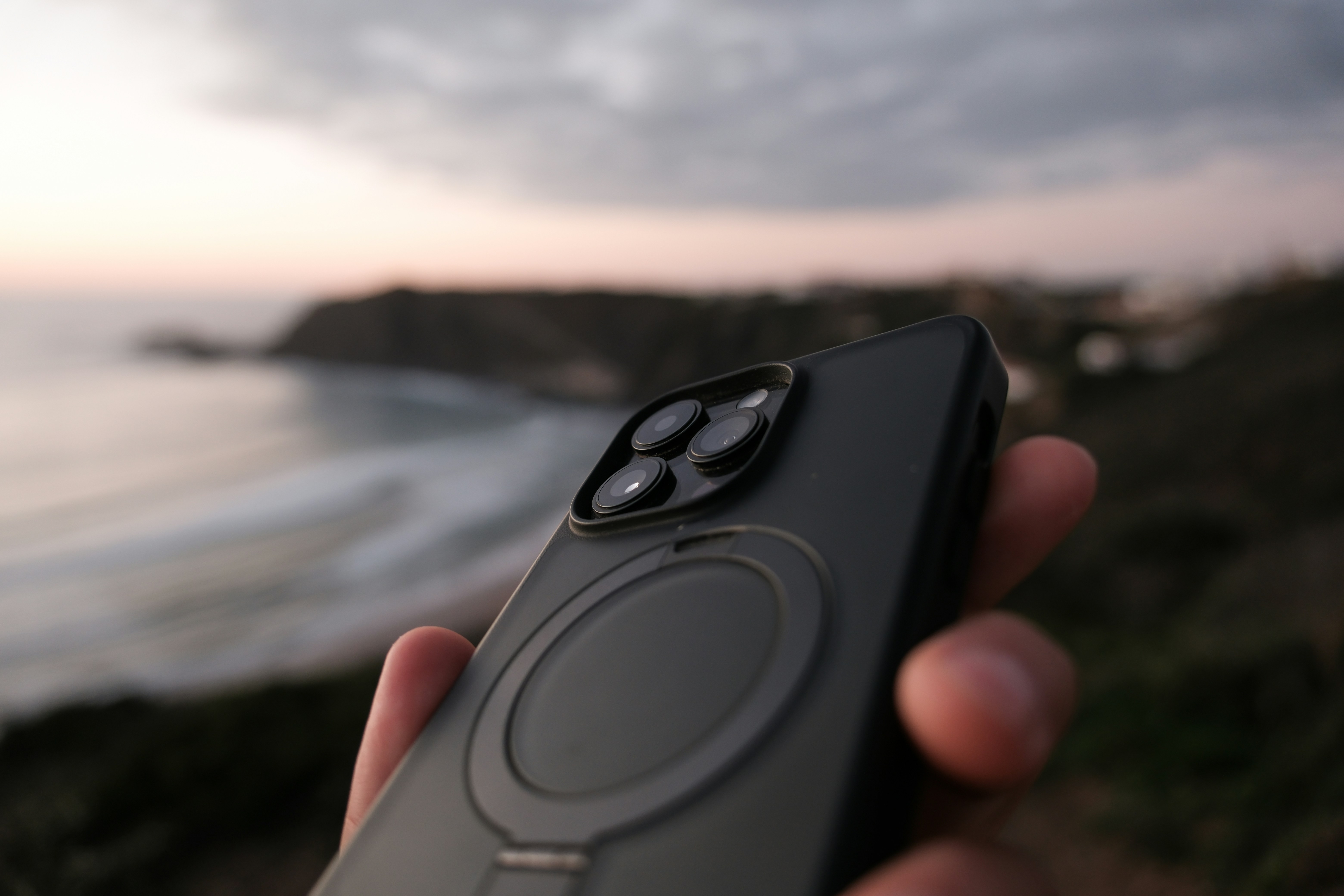 A close up of a person holding a cell phone photo – Free Iphone Image ...