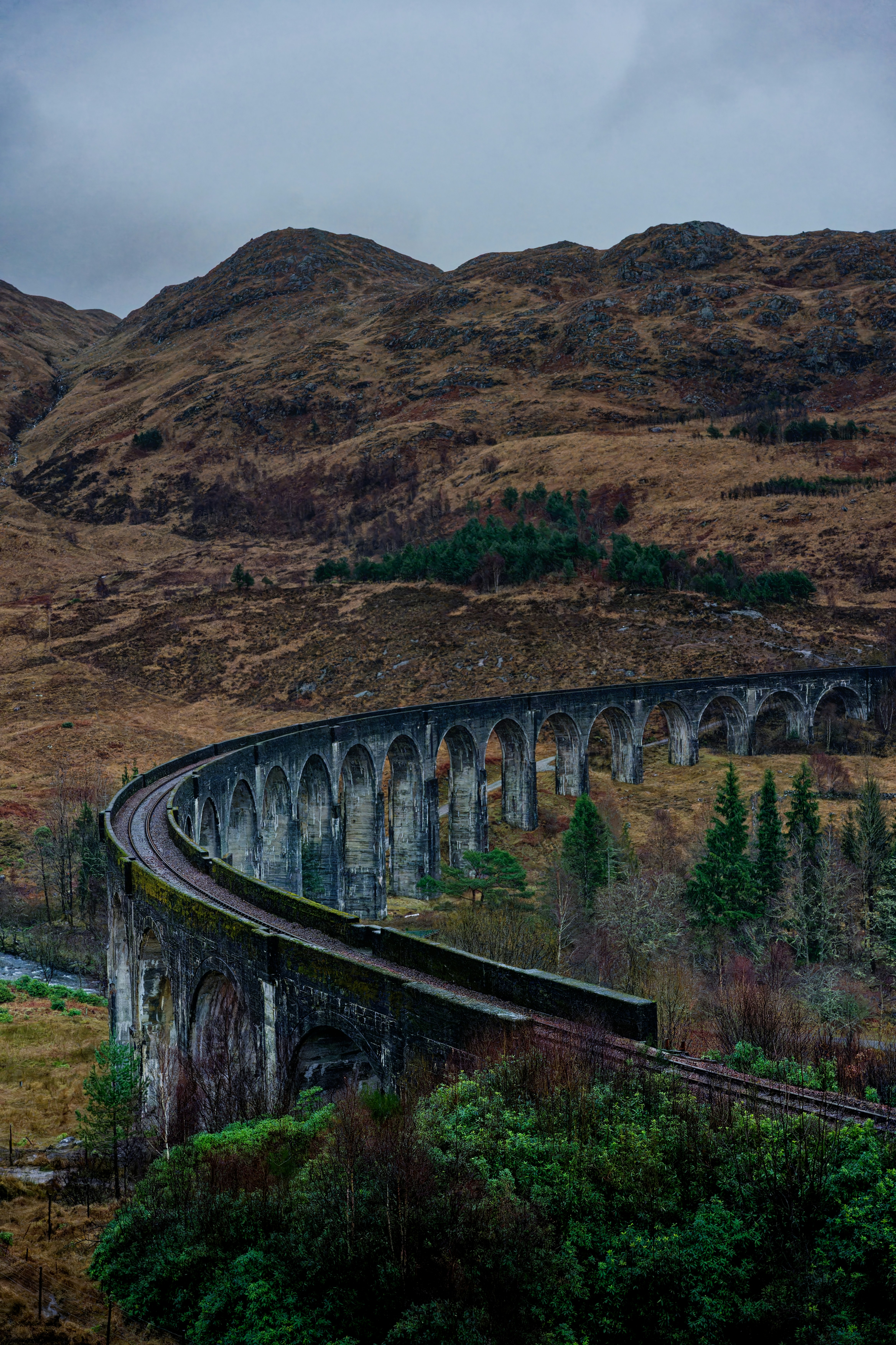 Curving Viaduct through Highland Terrains