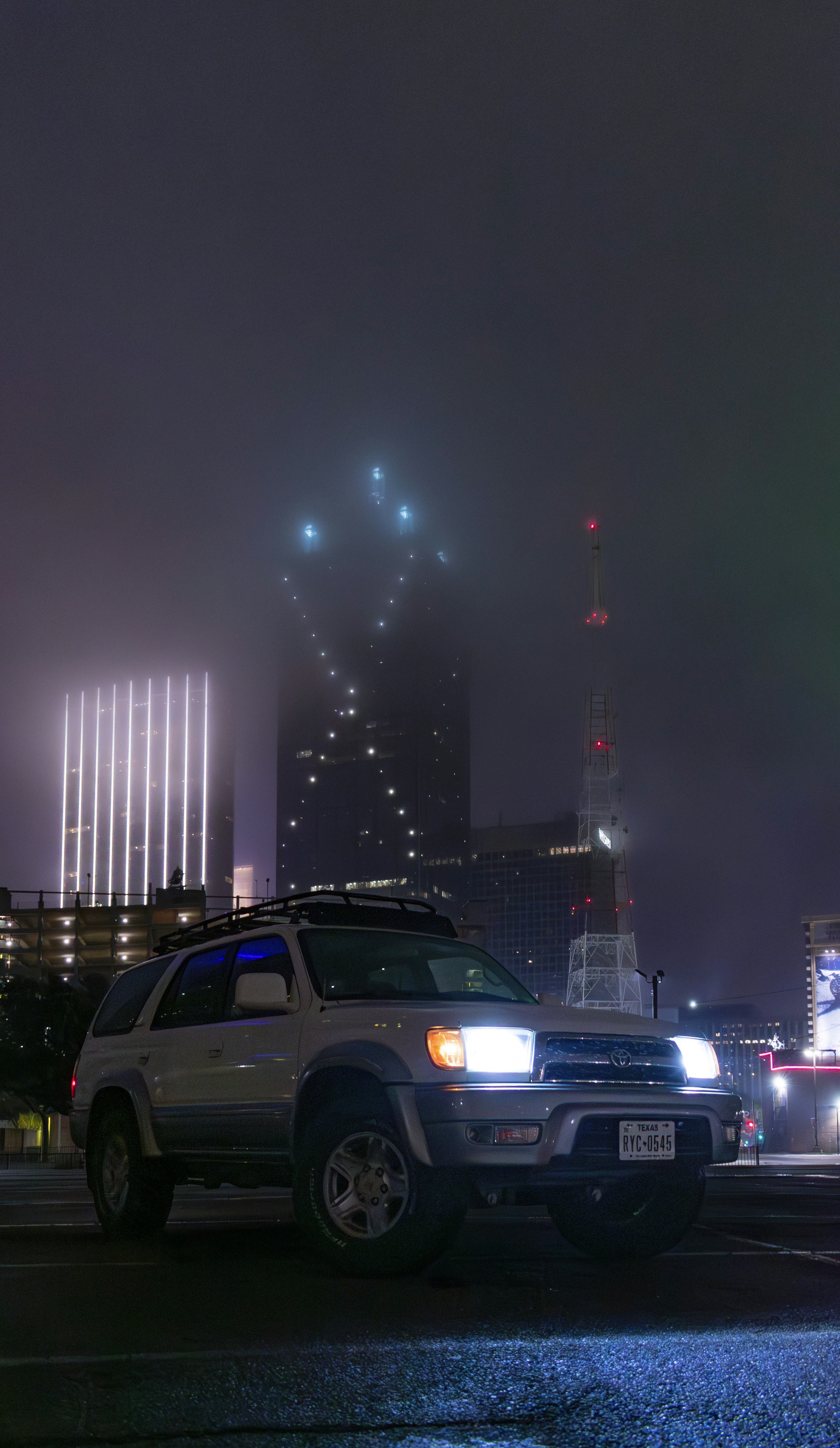 1999 Toyota 4Runner exploring the city in the fog