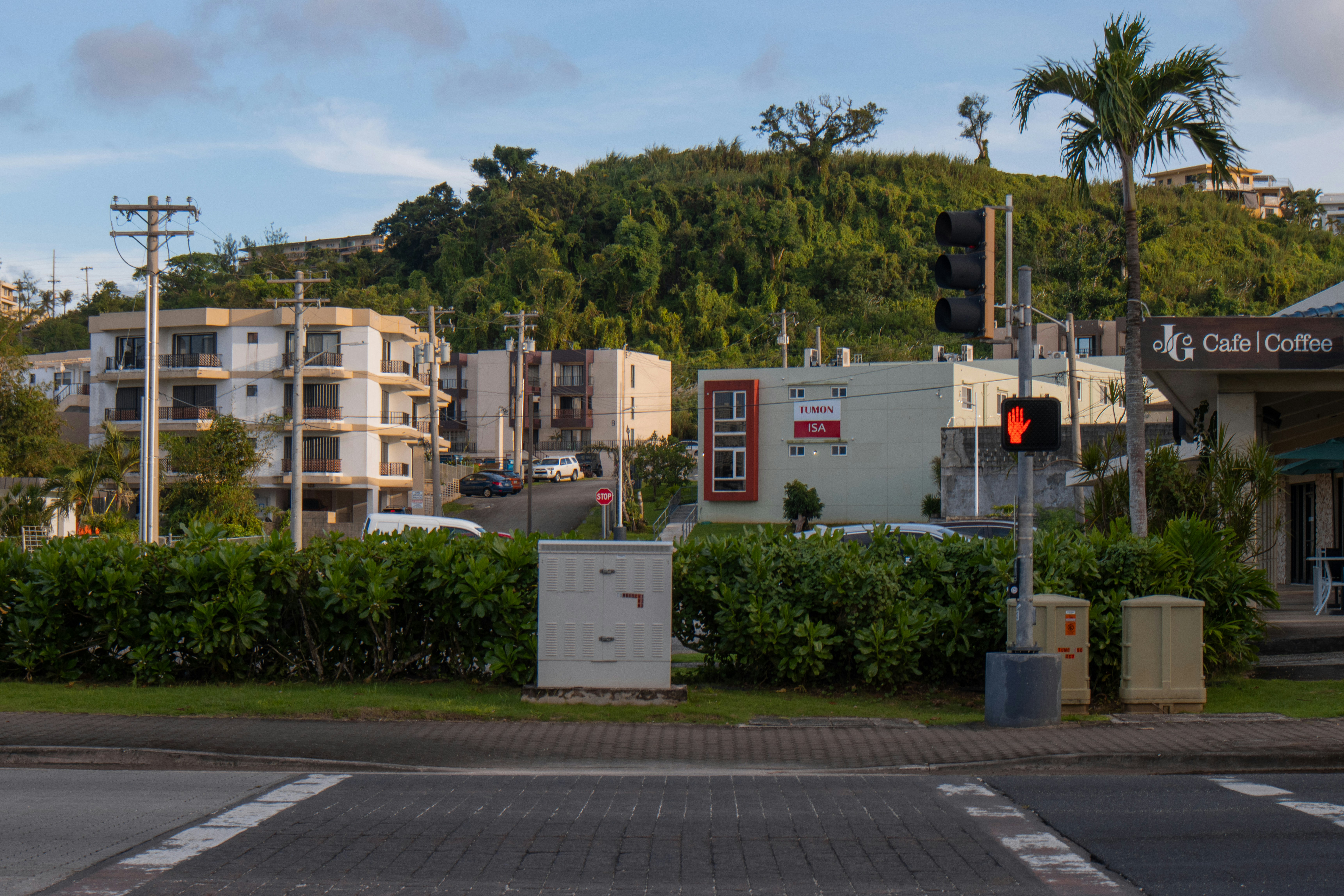 A traffic light sitting on the side of a road photo – Free Guam Image ...