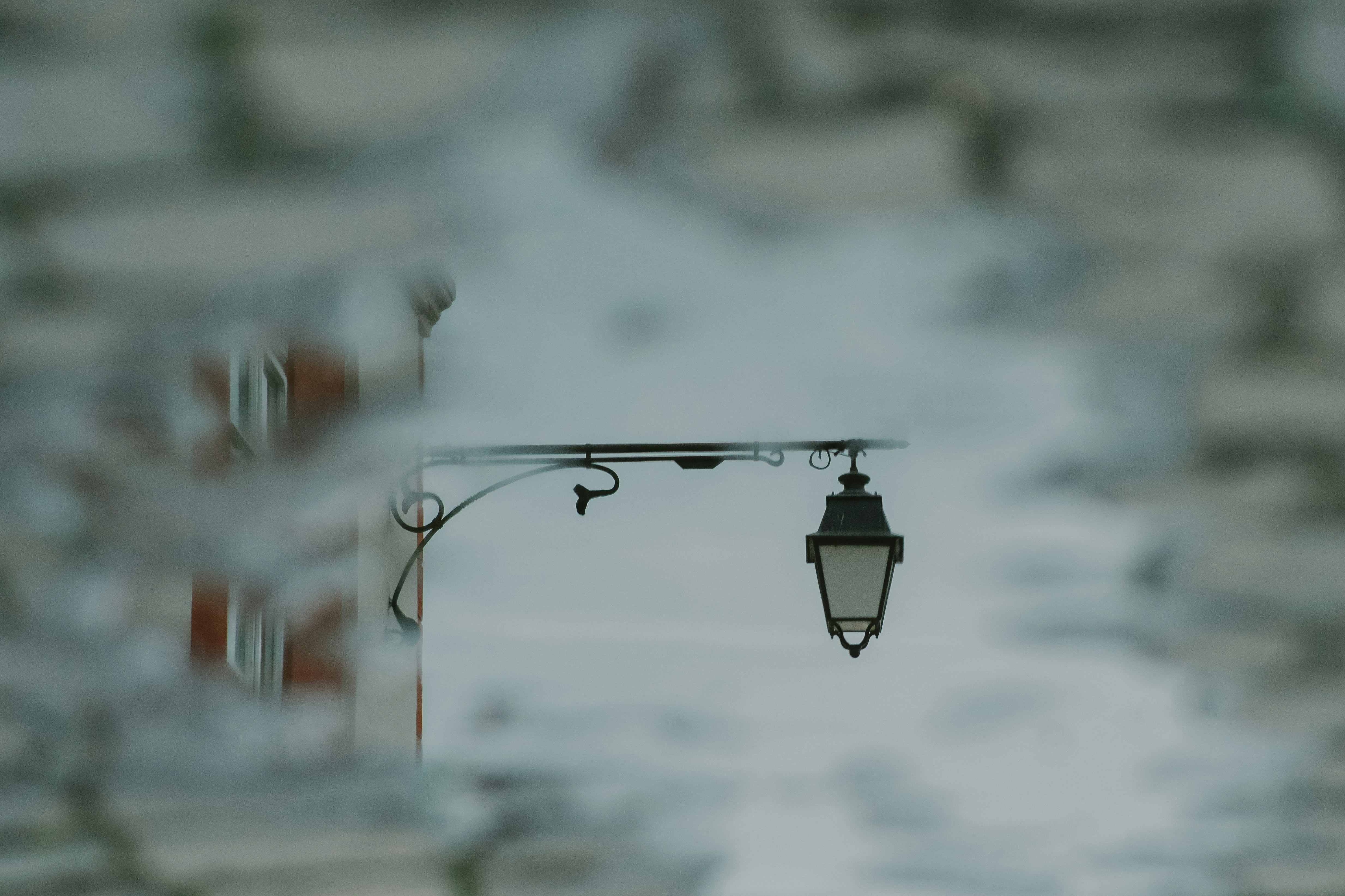 Puddle Echo: Lantern Glow in a Quiet Street