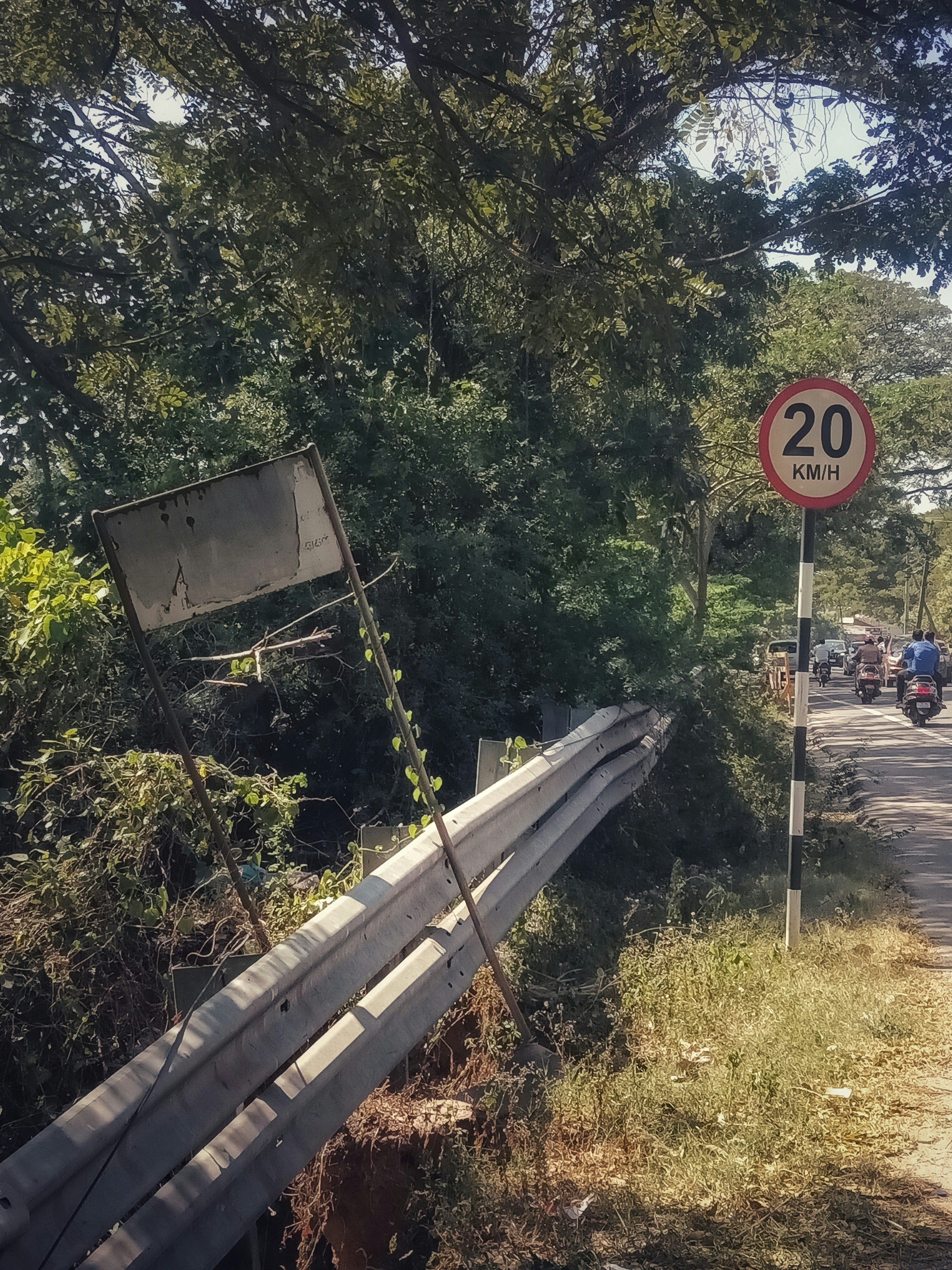 a road with a sign that reads 20 on it