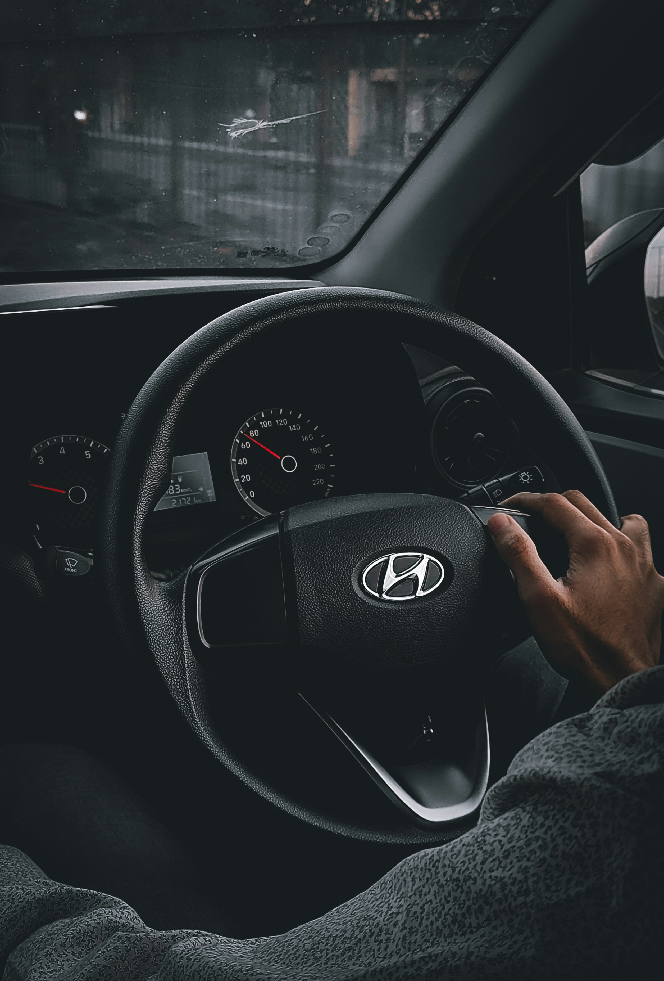 Midnight Grip: Hands on the Hyundai Wheel in a Quiet Cabin