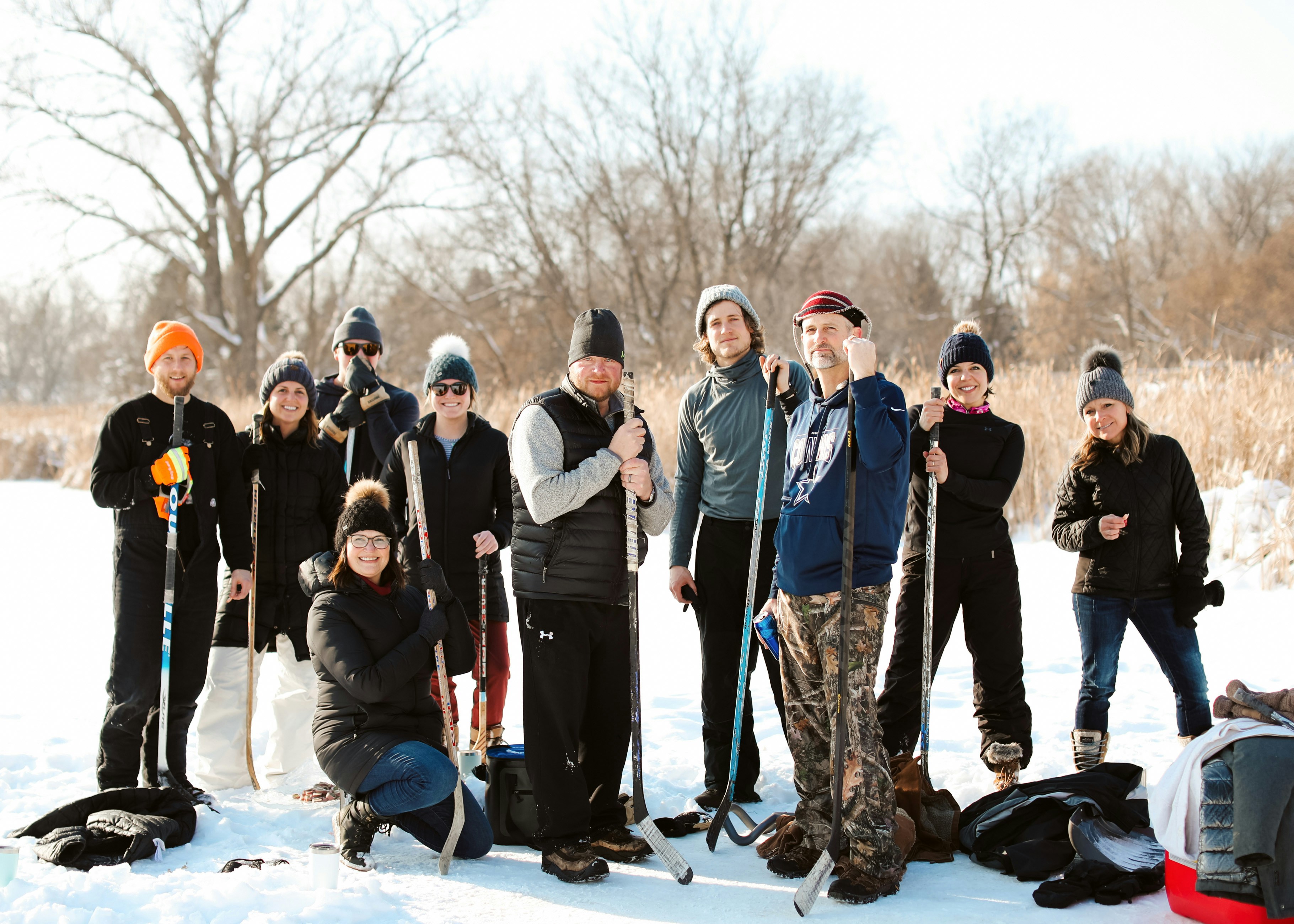Snowbound Collective: A Shovel-Wielding Team Stands in Winter Light