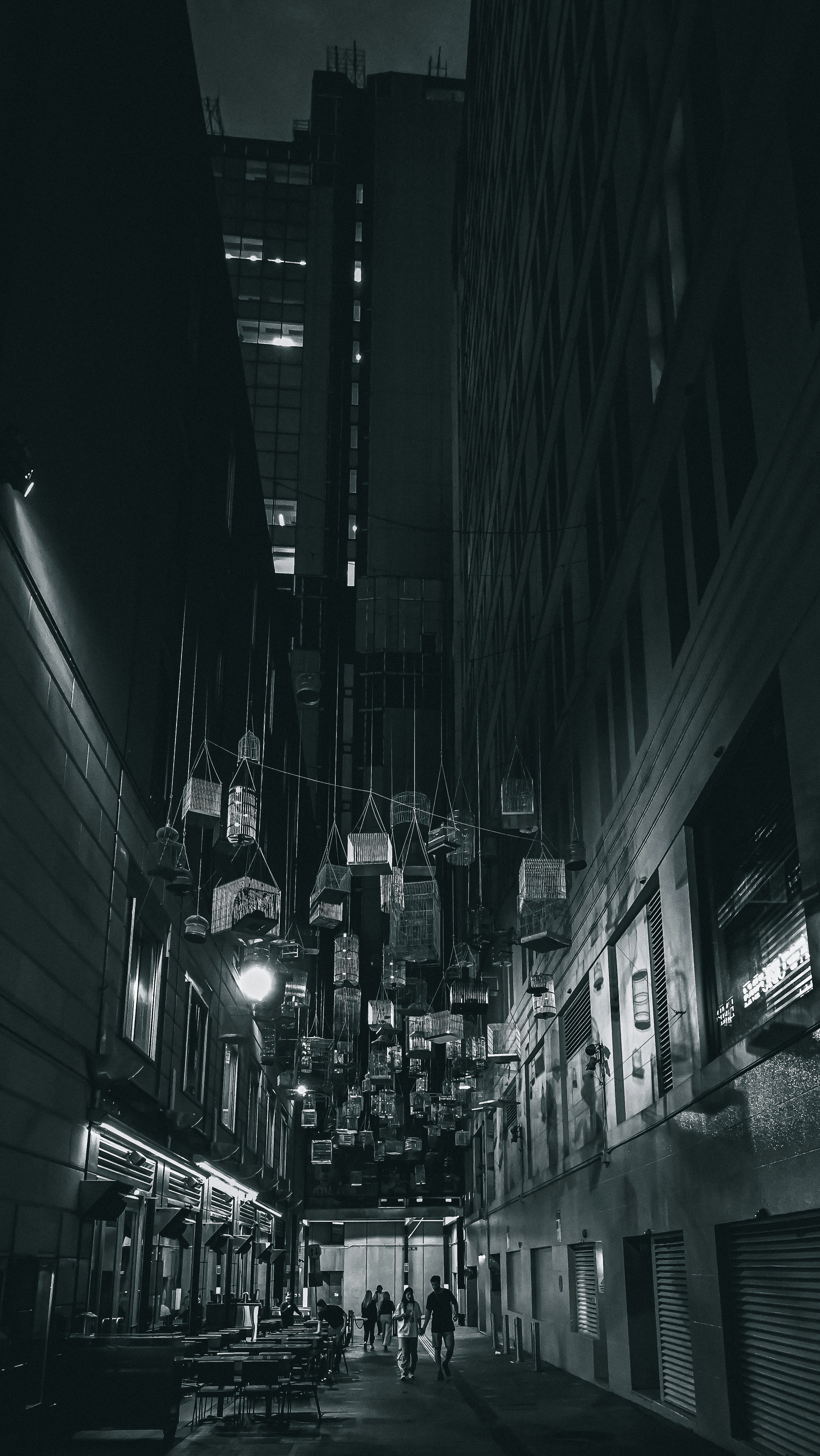 Lantern Strings and Shadowed Walls: A Quiet Night Walk Through a Narrow Alley