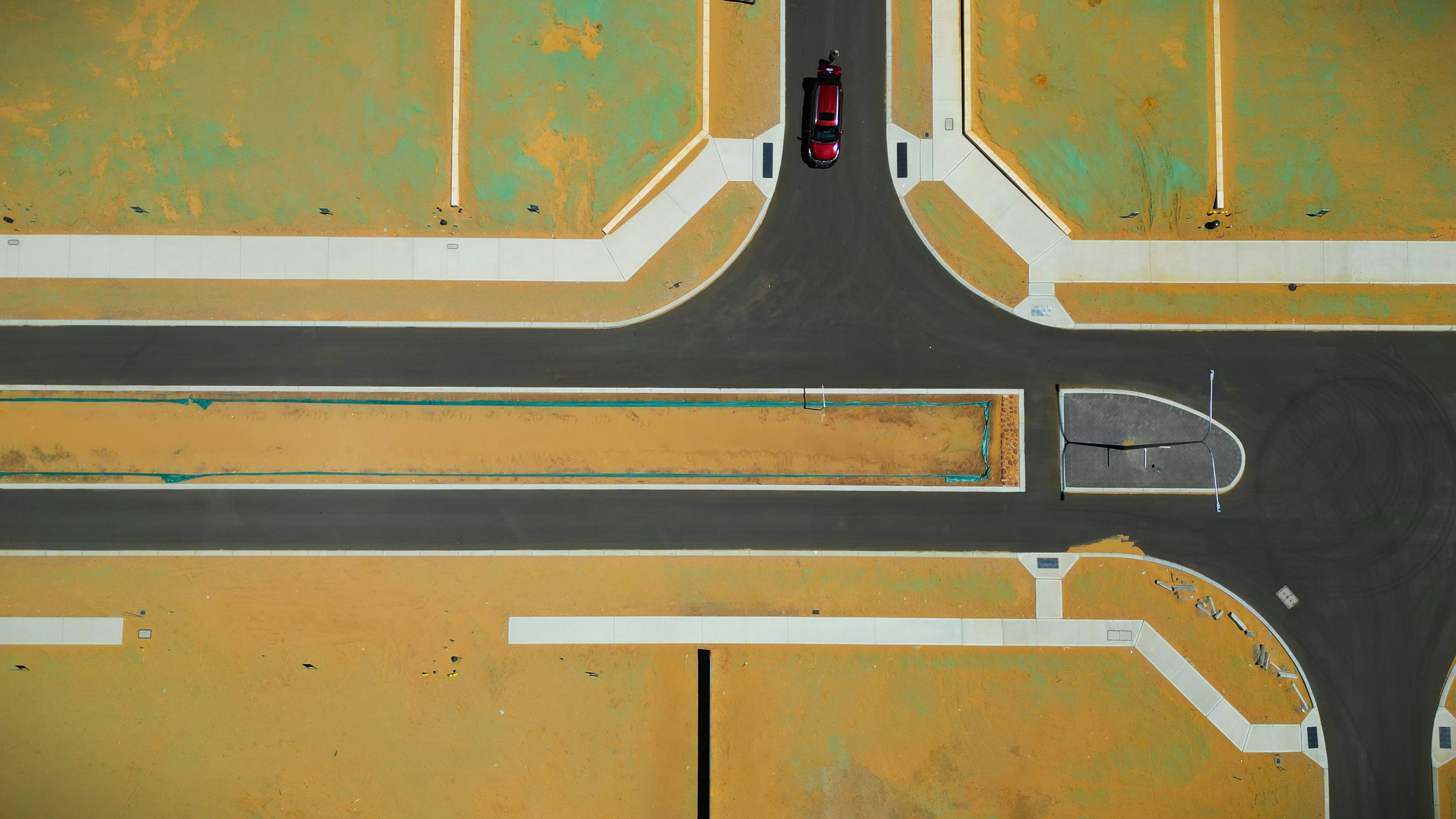 An overhead view of an intersection with a red car photo – Free Perth ...
