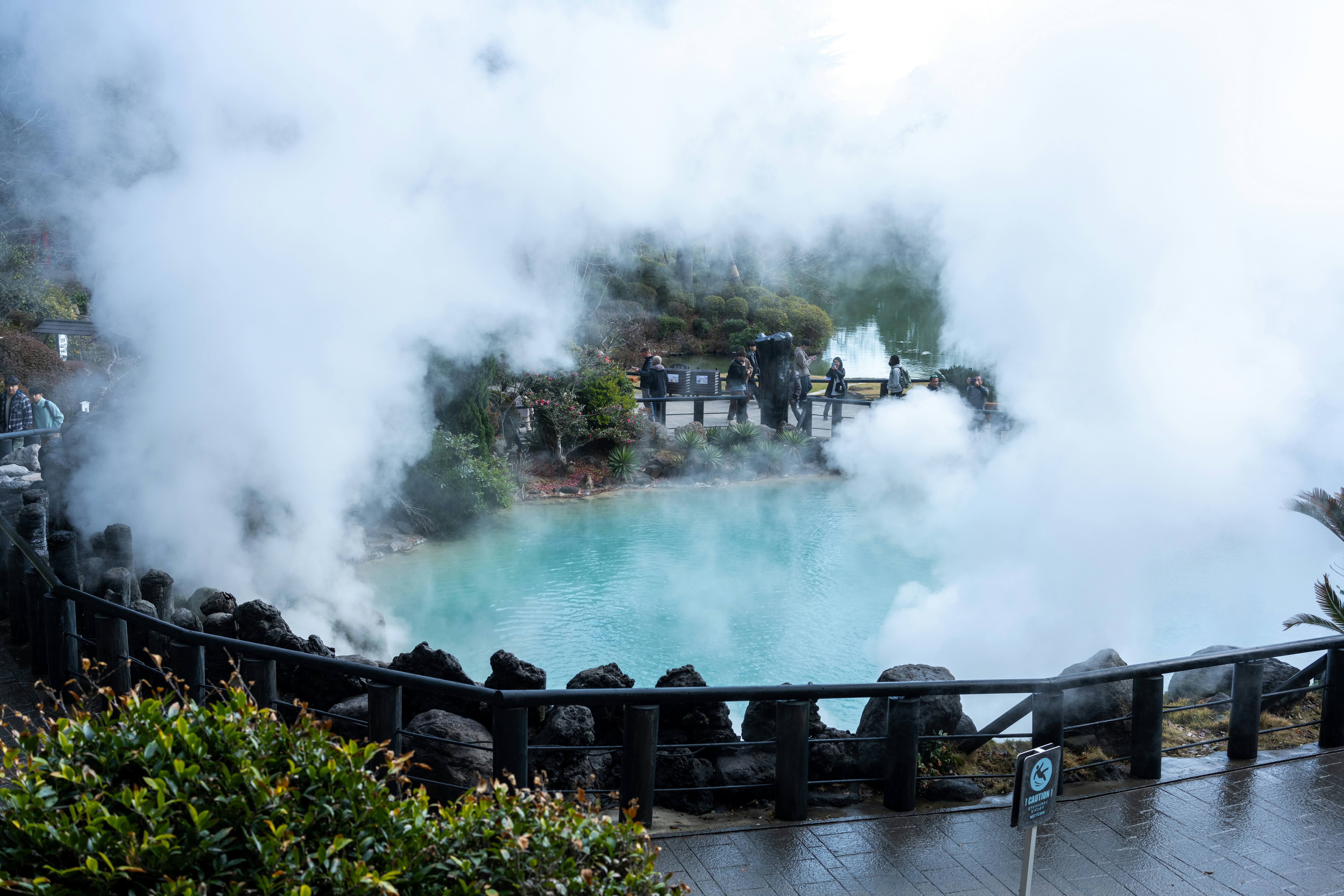 A large pool of water surrounded by steam photo – Free Blue Image on ...