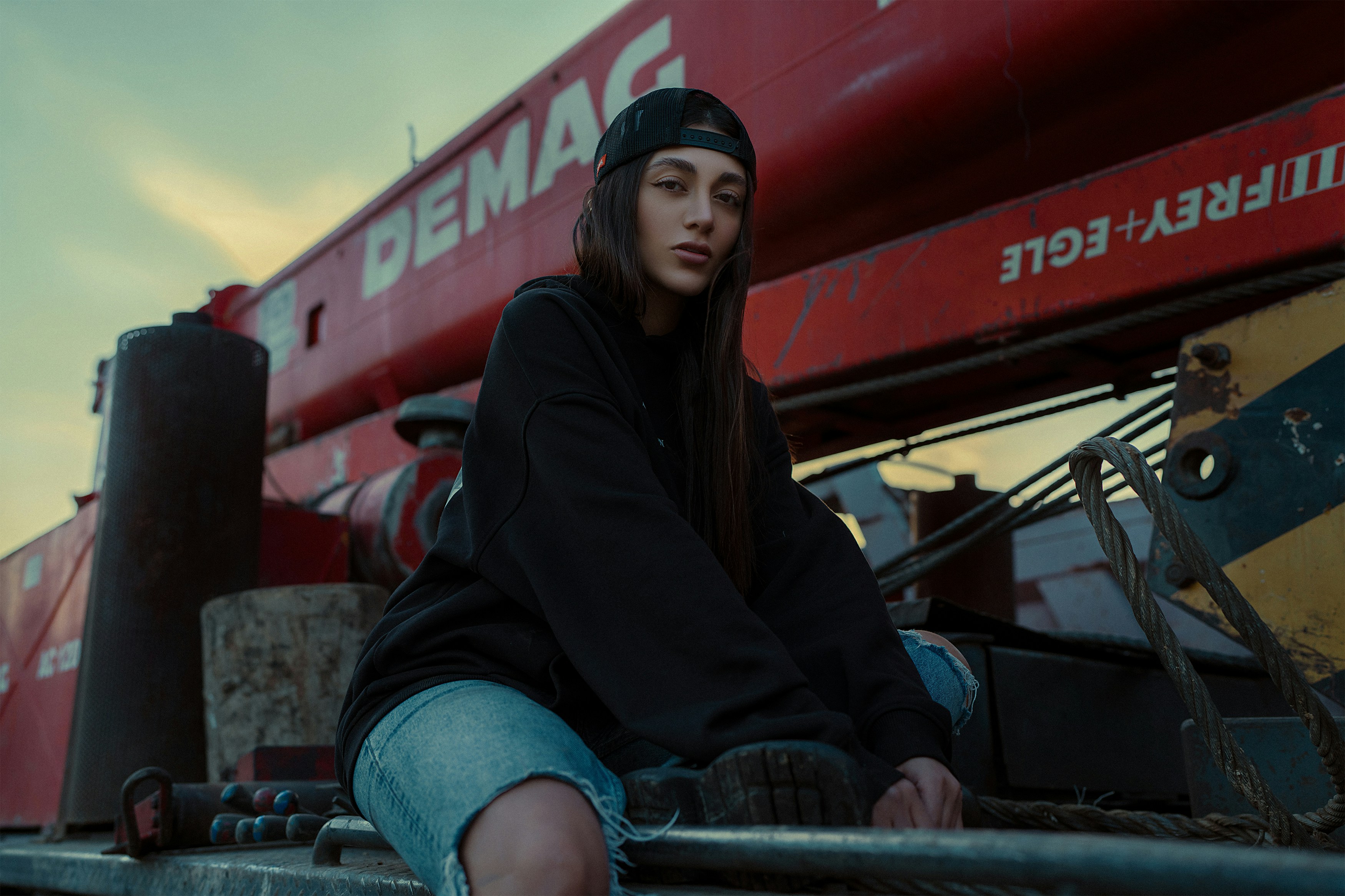 Urban Edge: Portrait Amidst Machinery
