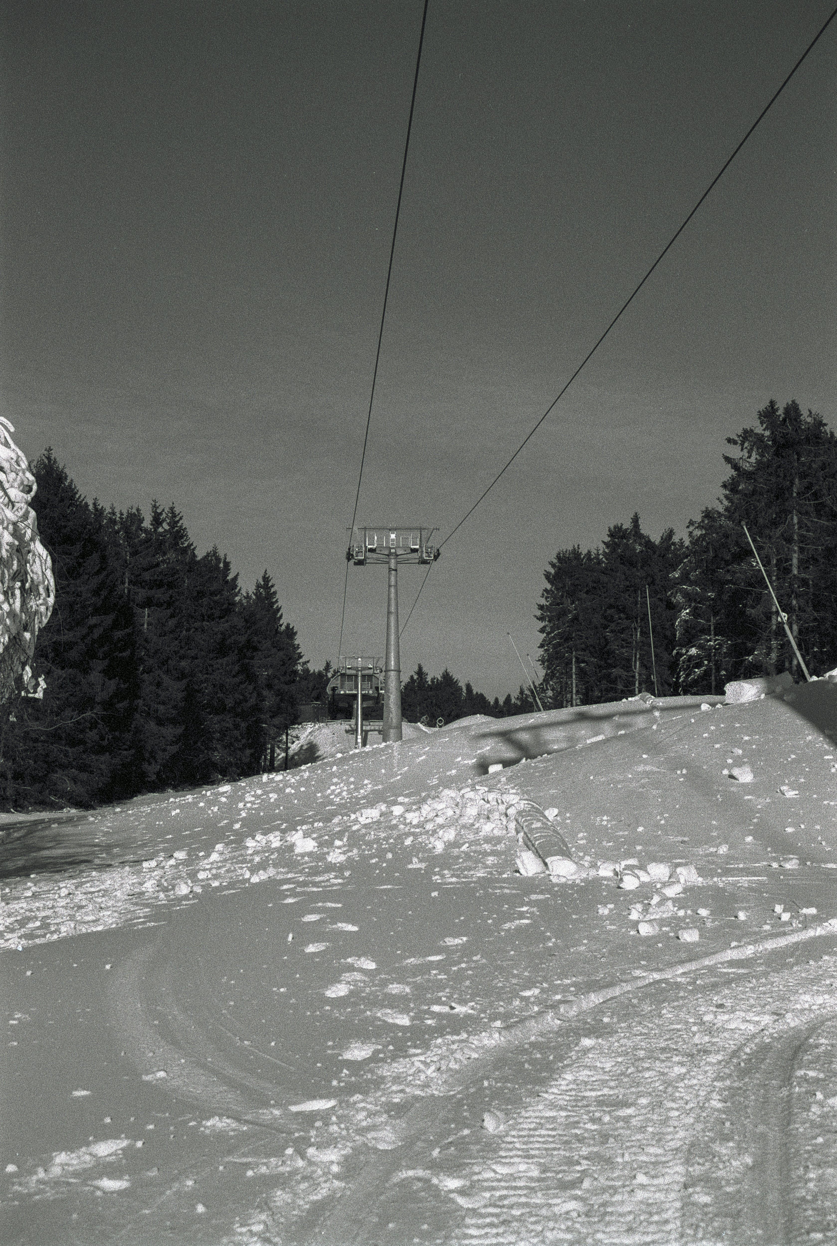 Tethered Silence Along a Snow-Capped Lift