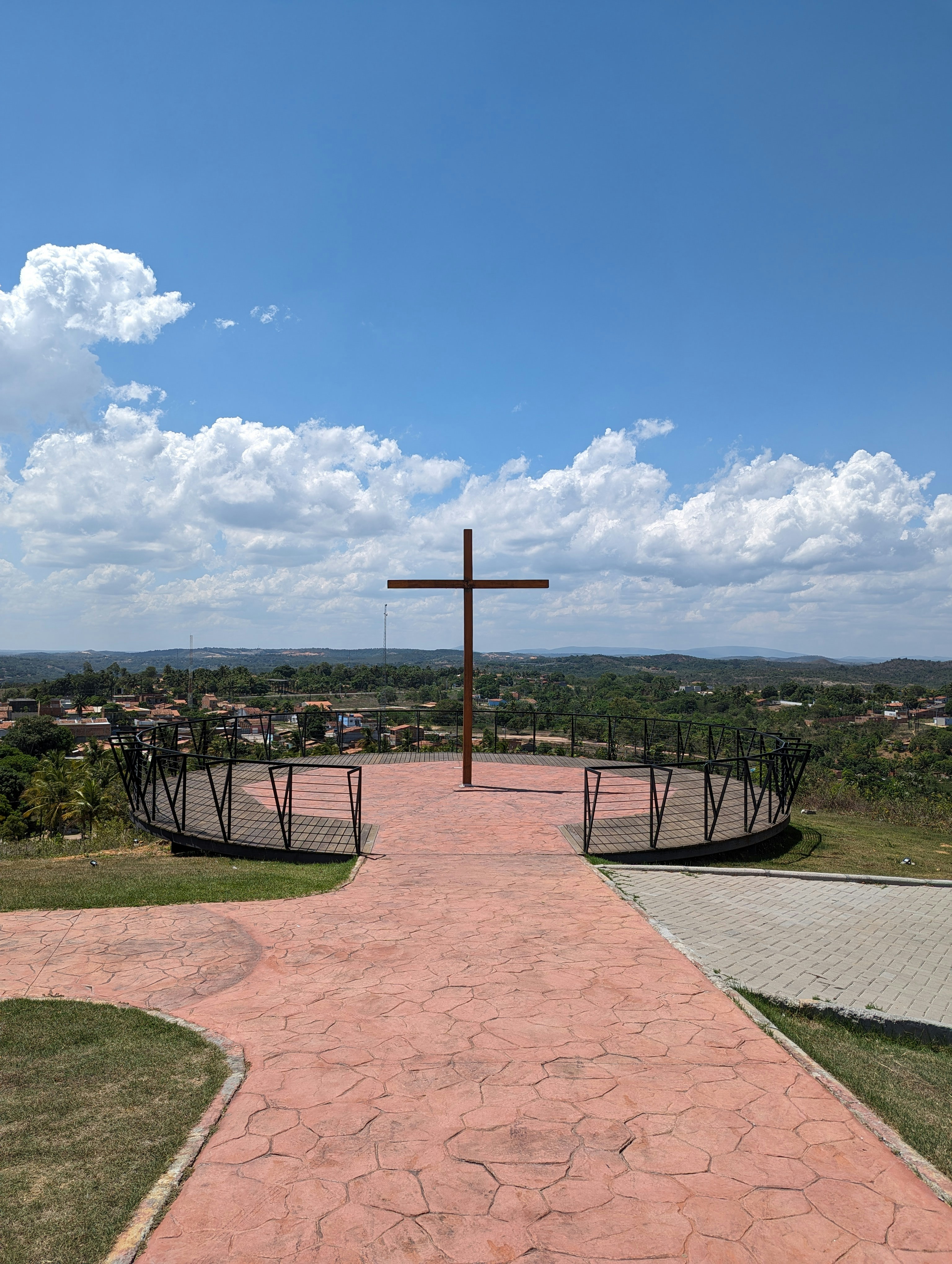 Cruciform Promenade: A Peach-Hued Path to the Sky