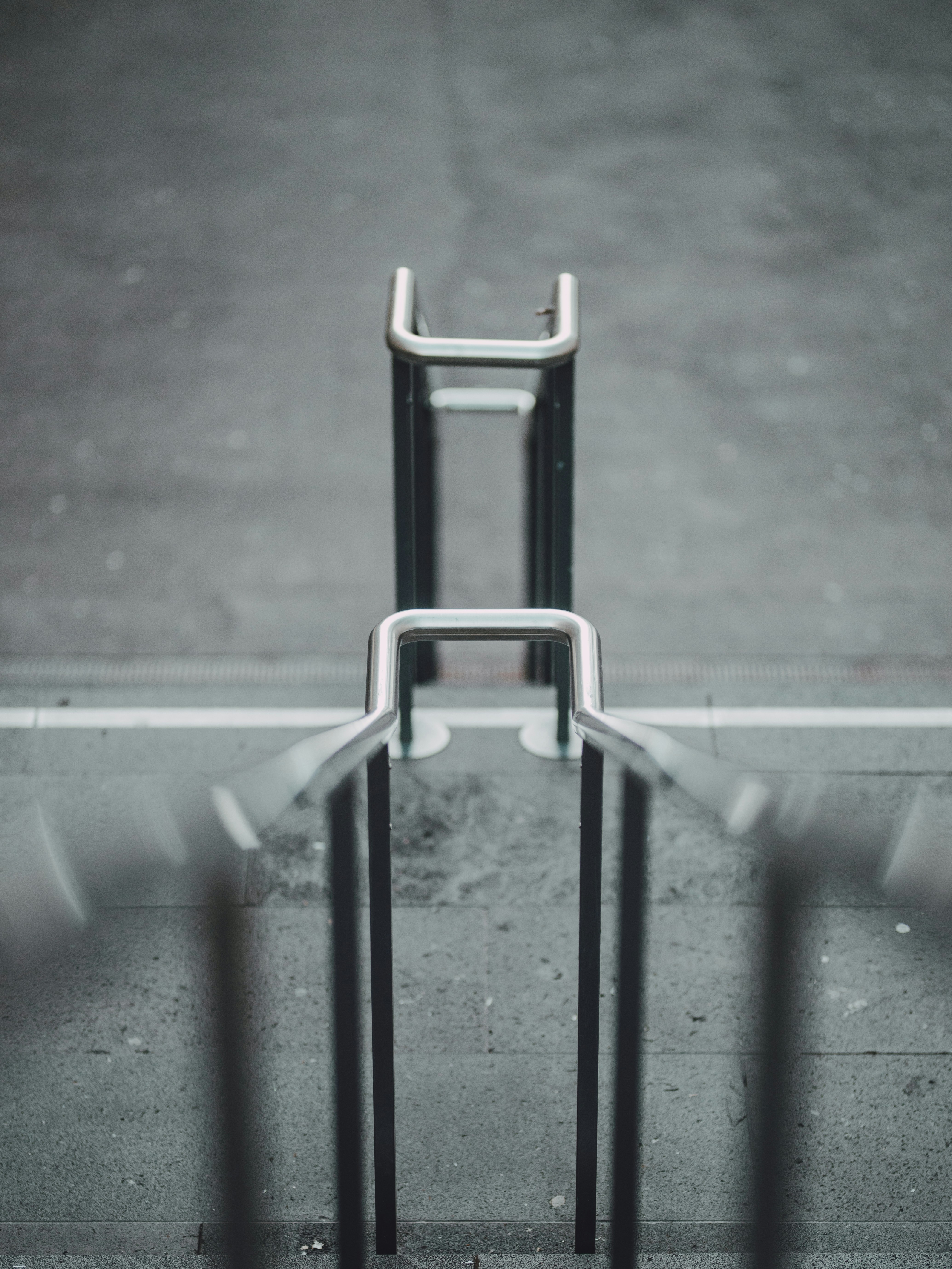 Center Rails: A Symmetrical Pause on Cold Concrete