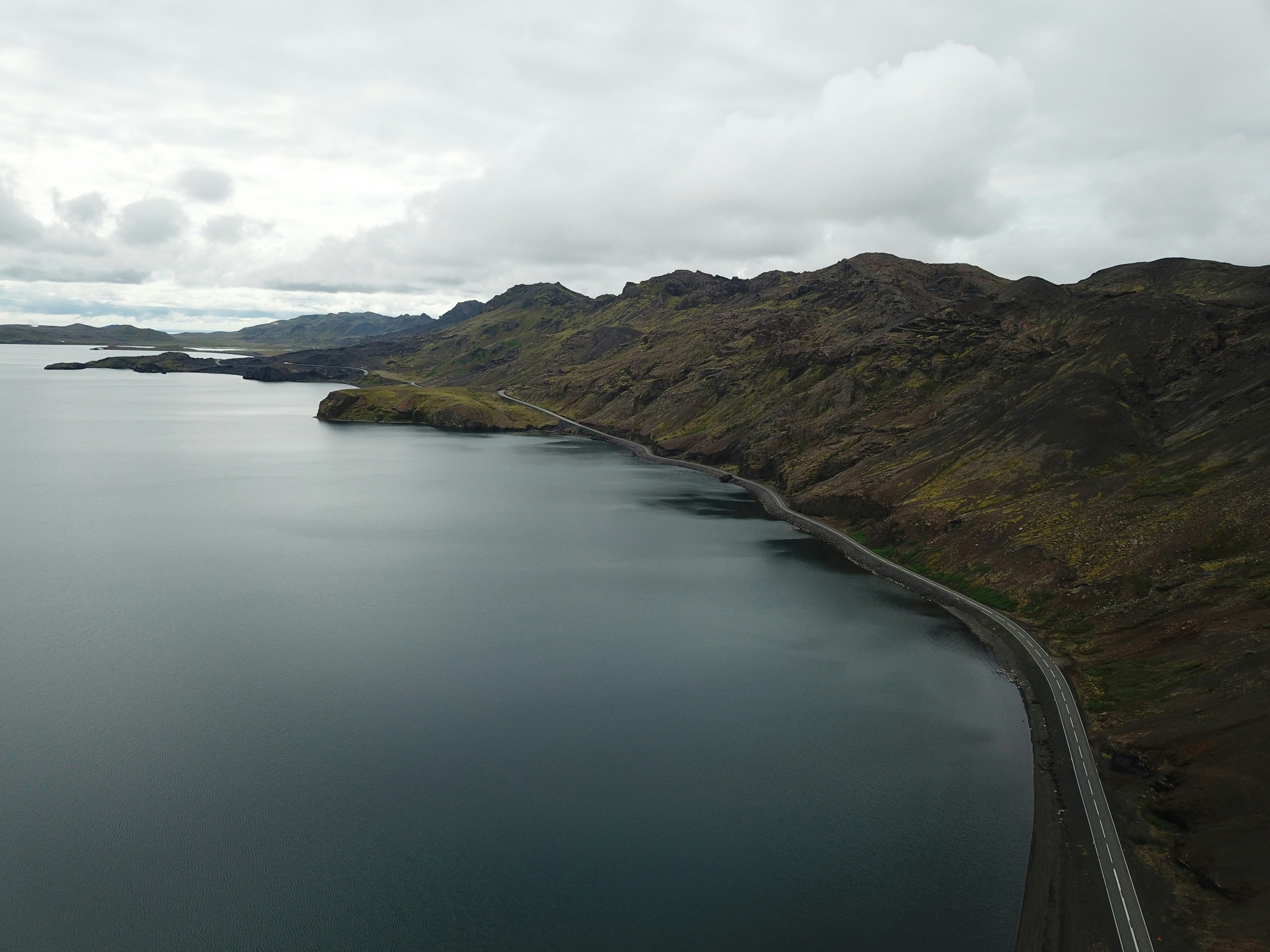a large body of water surrounded by mountains