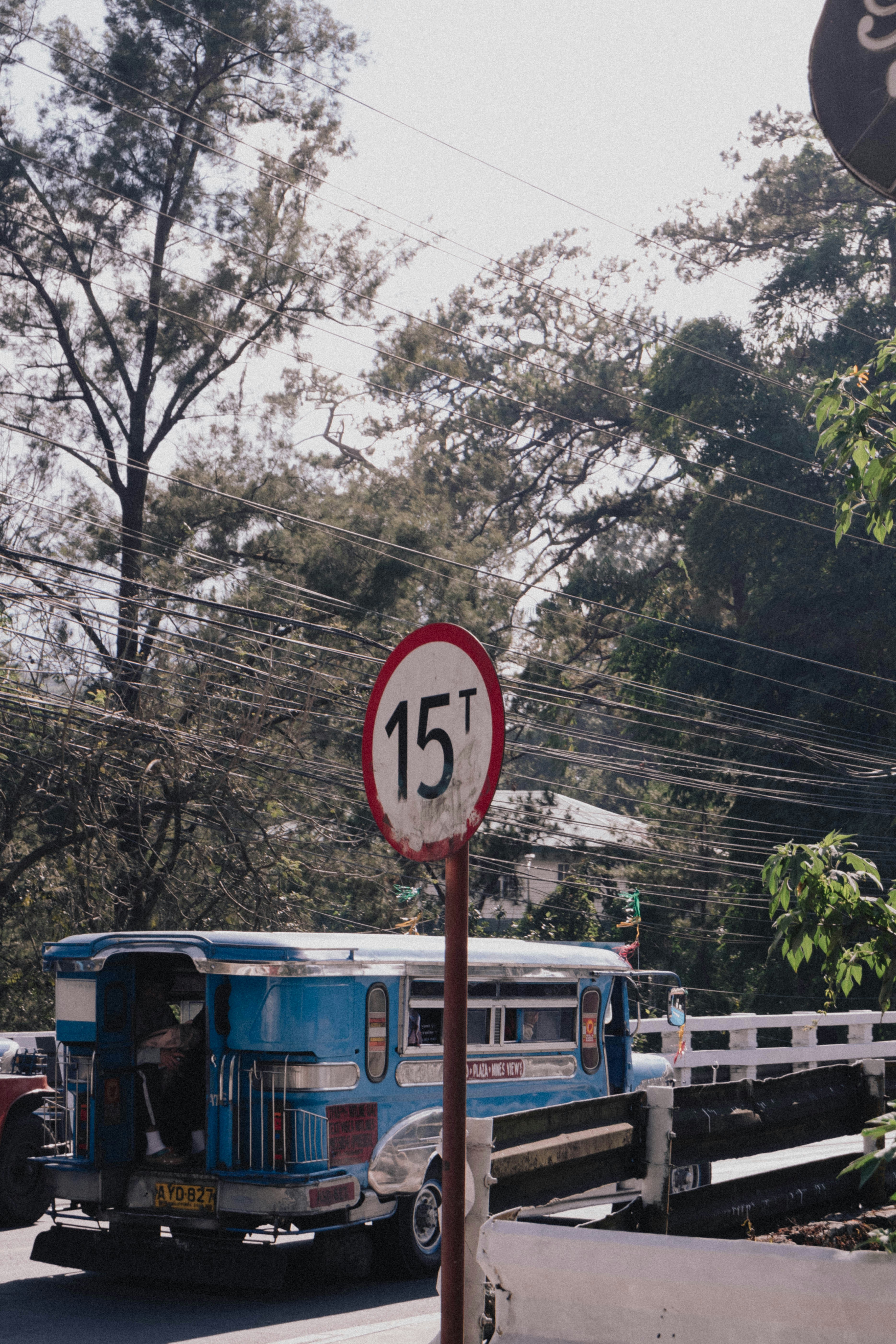 Blue Trolley at the Edge of a Quiet Street
