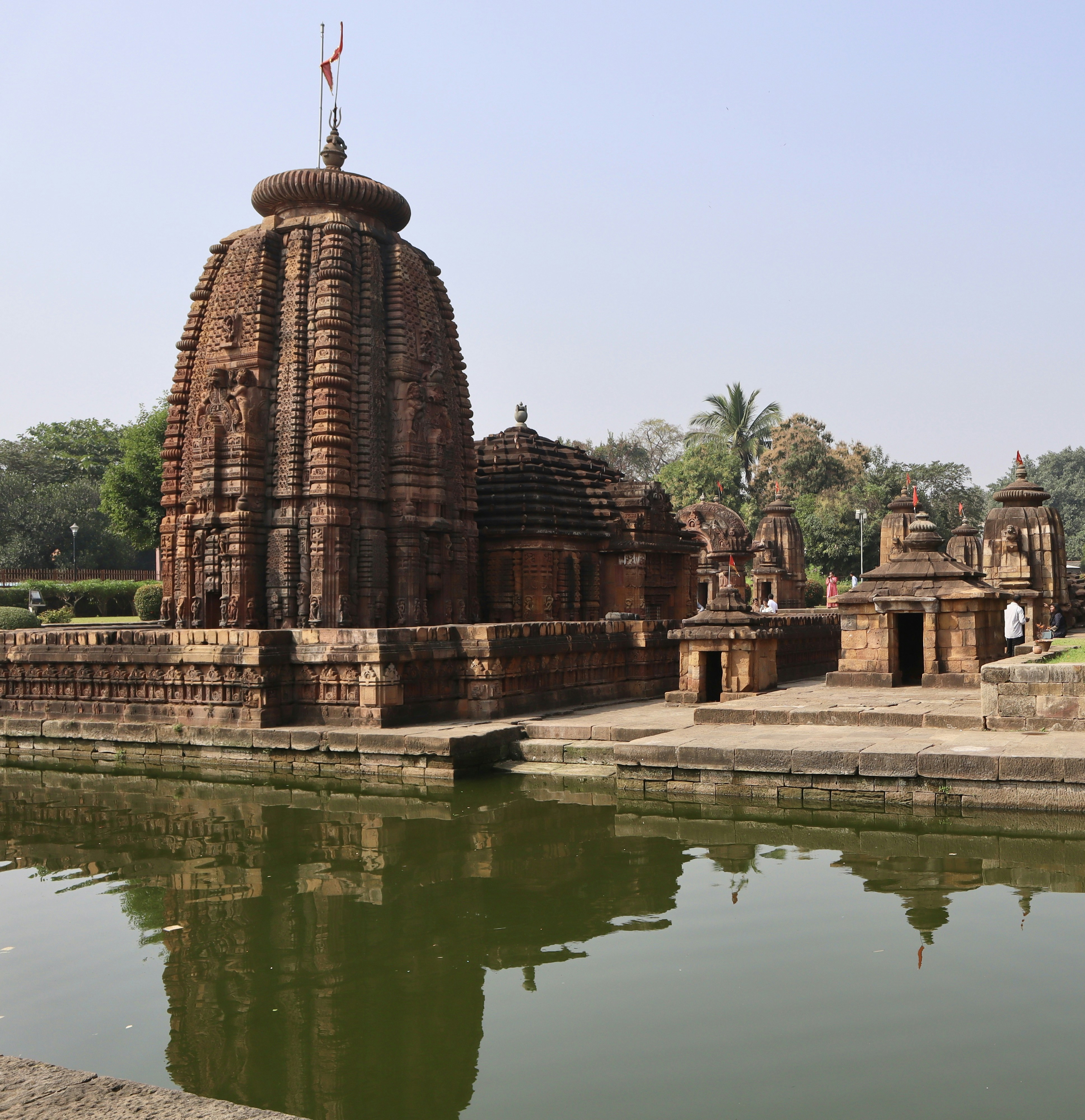 A body of water in front of a building photo – Free Odisha Image on ...