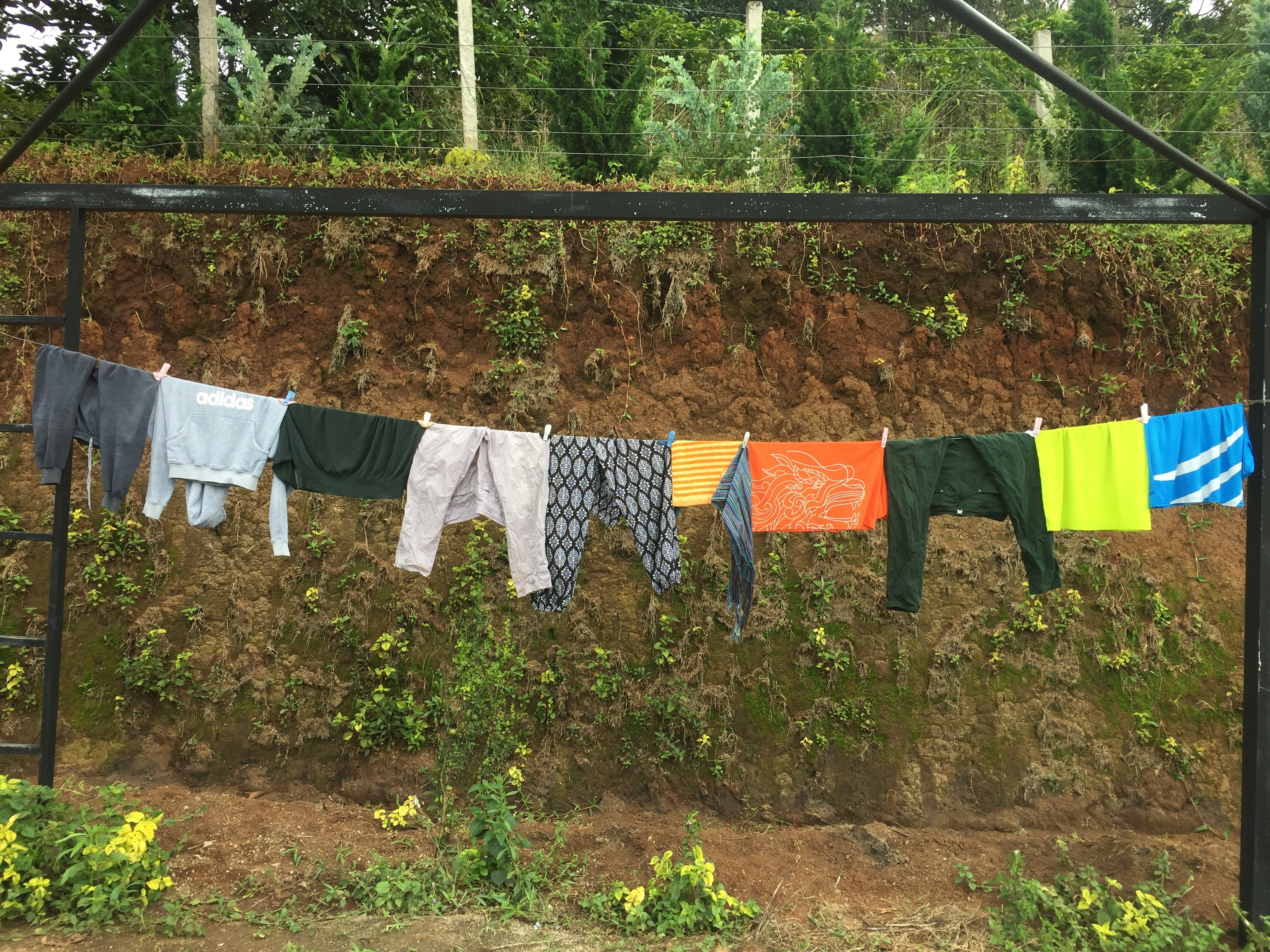 Colorful Garments Strung Across a Sloped Backdrop