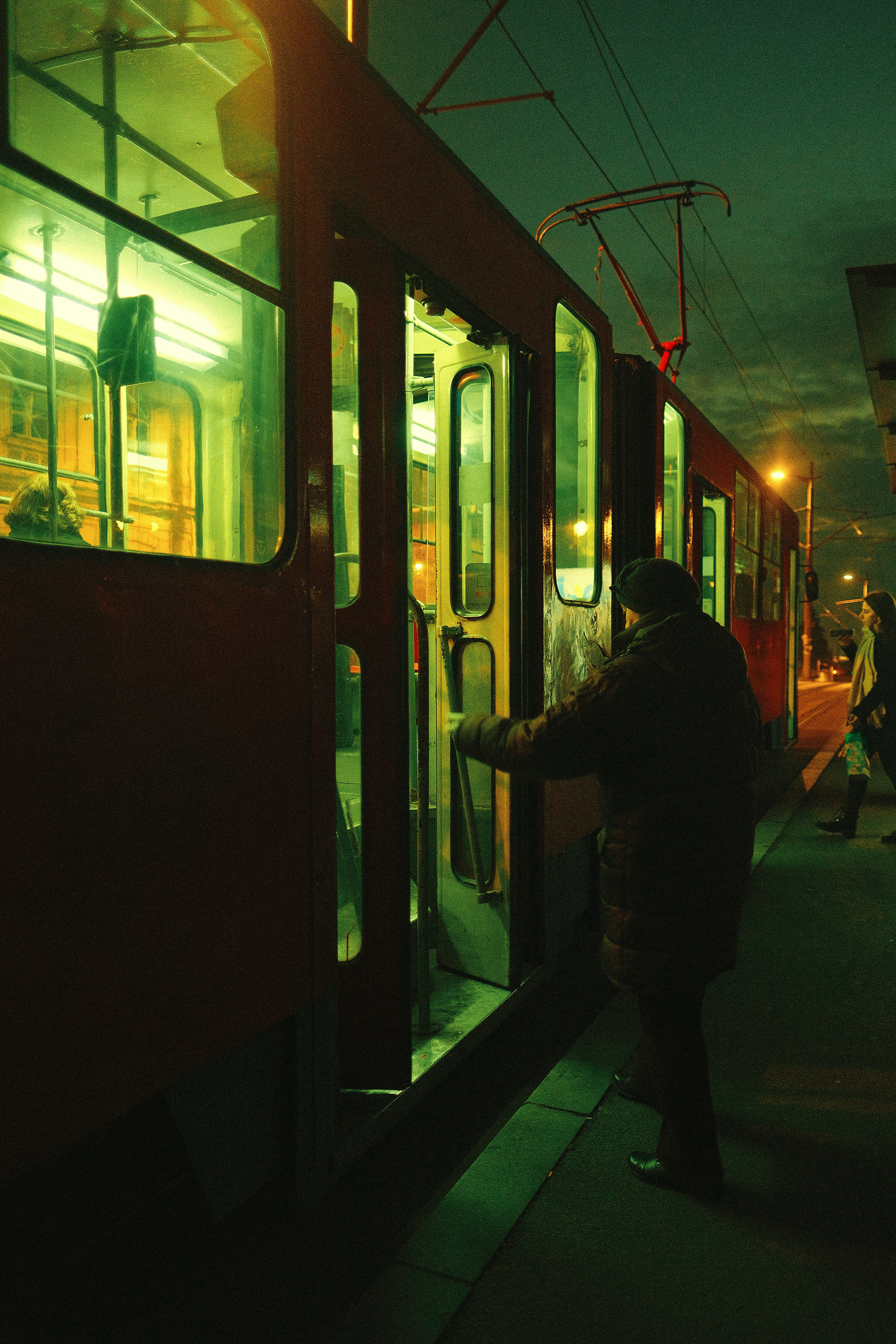 Night Line, Open Door: A Quiet Moment on the Neon Streetcar