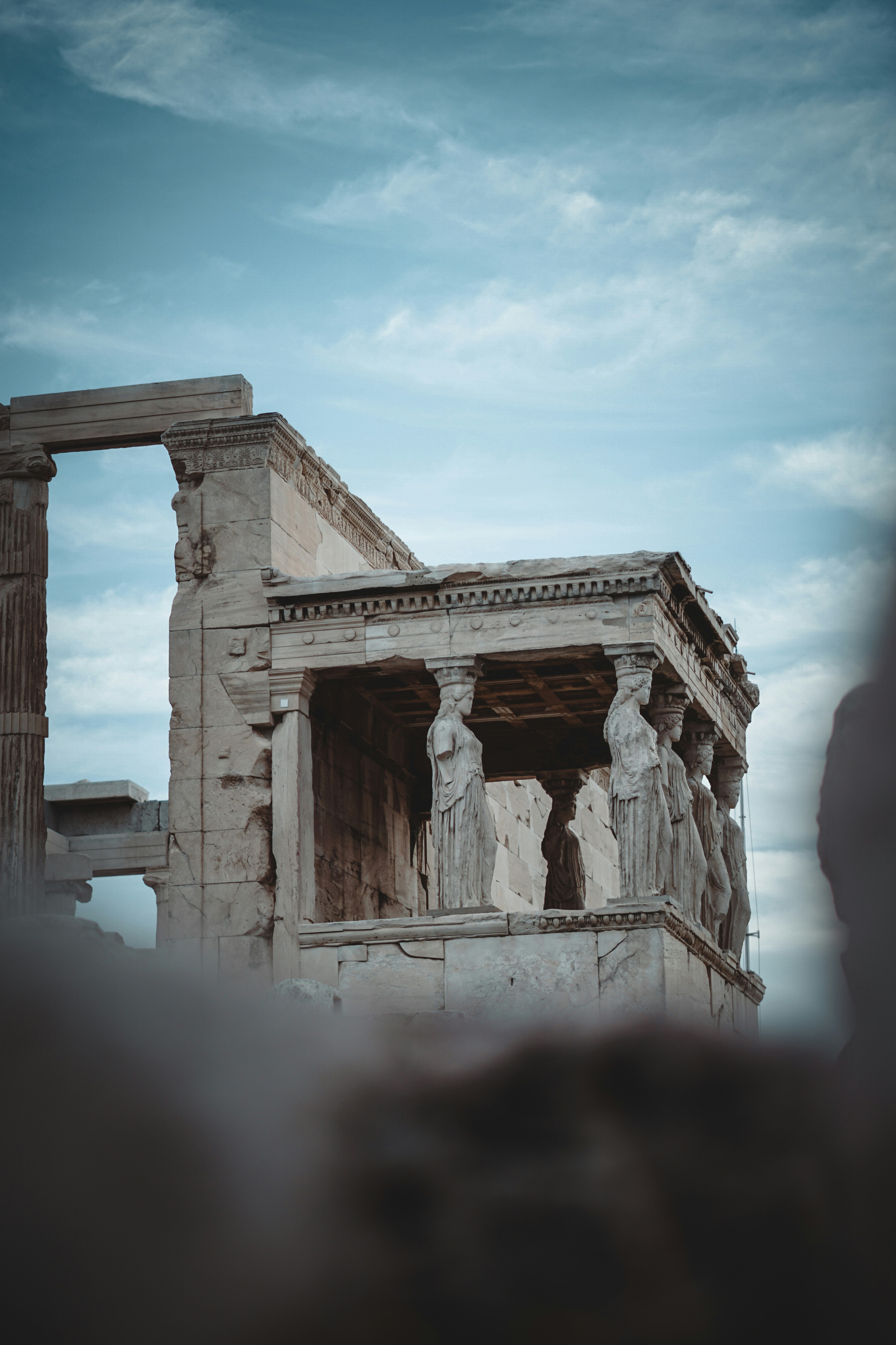 Ancient Greek Parthenon Frieze in Focus: Weathered Columns Framed by Sky