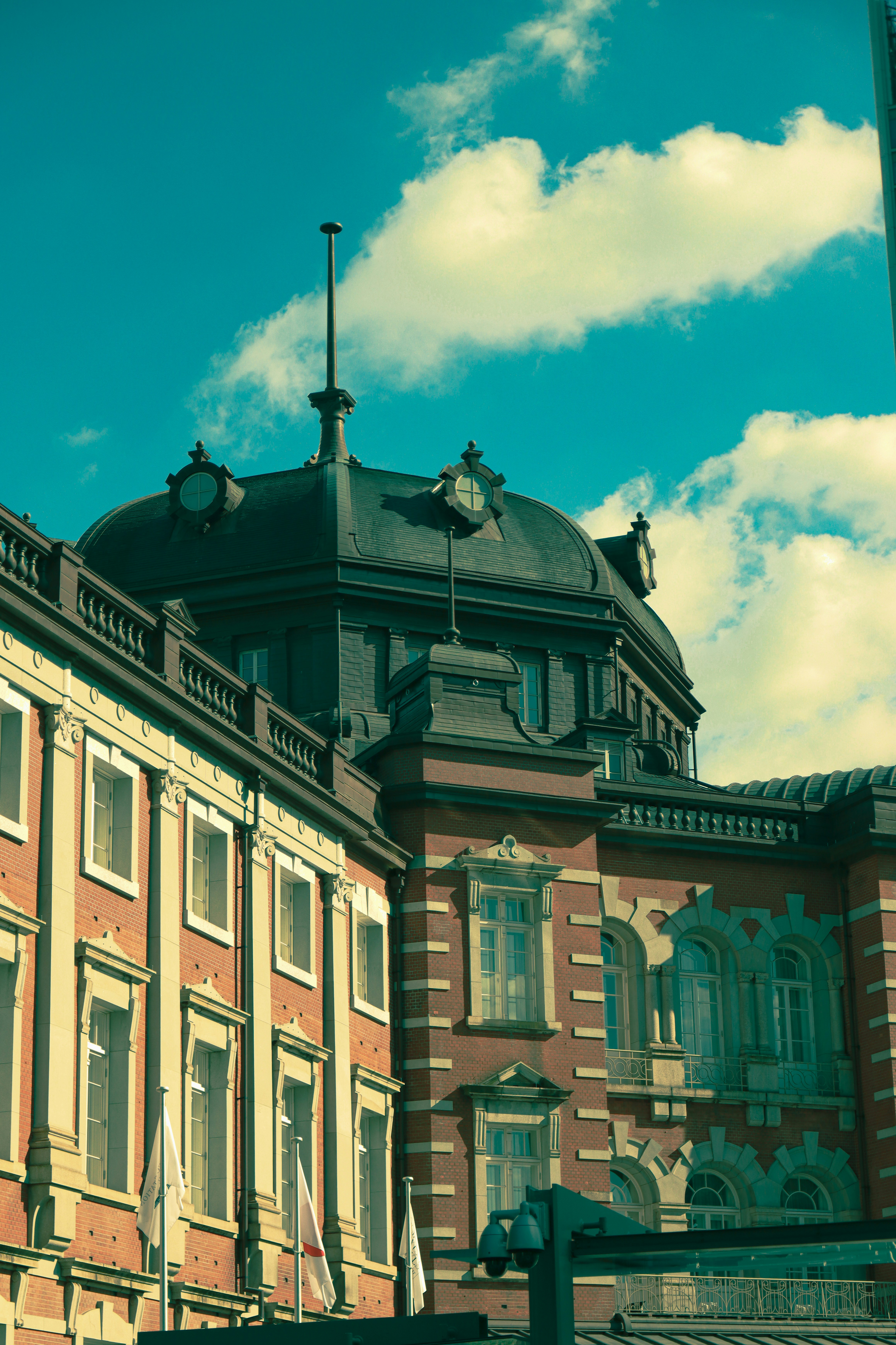 Dome-Topped Brick Architecture under a Turquoise Sky