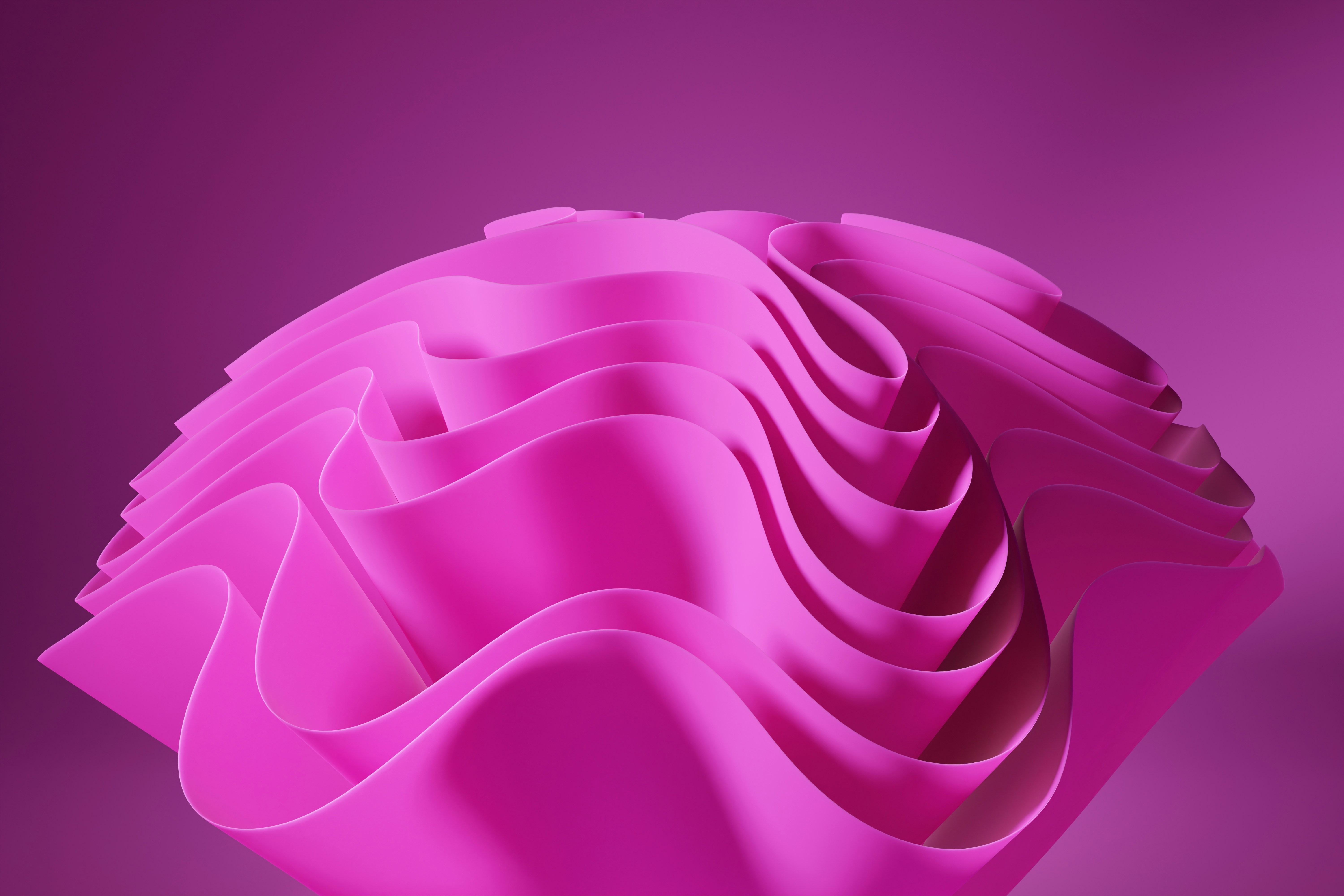 Se muestra un gran objeto rosa sobre un fondo púrpura foto – Imagen de ...