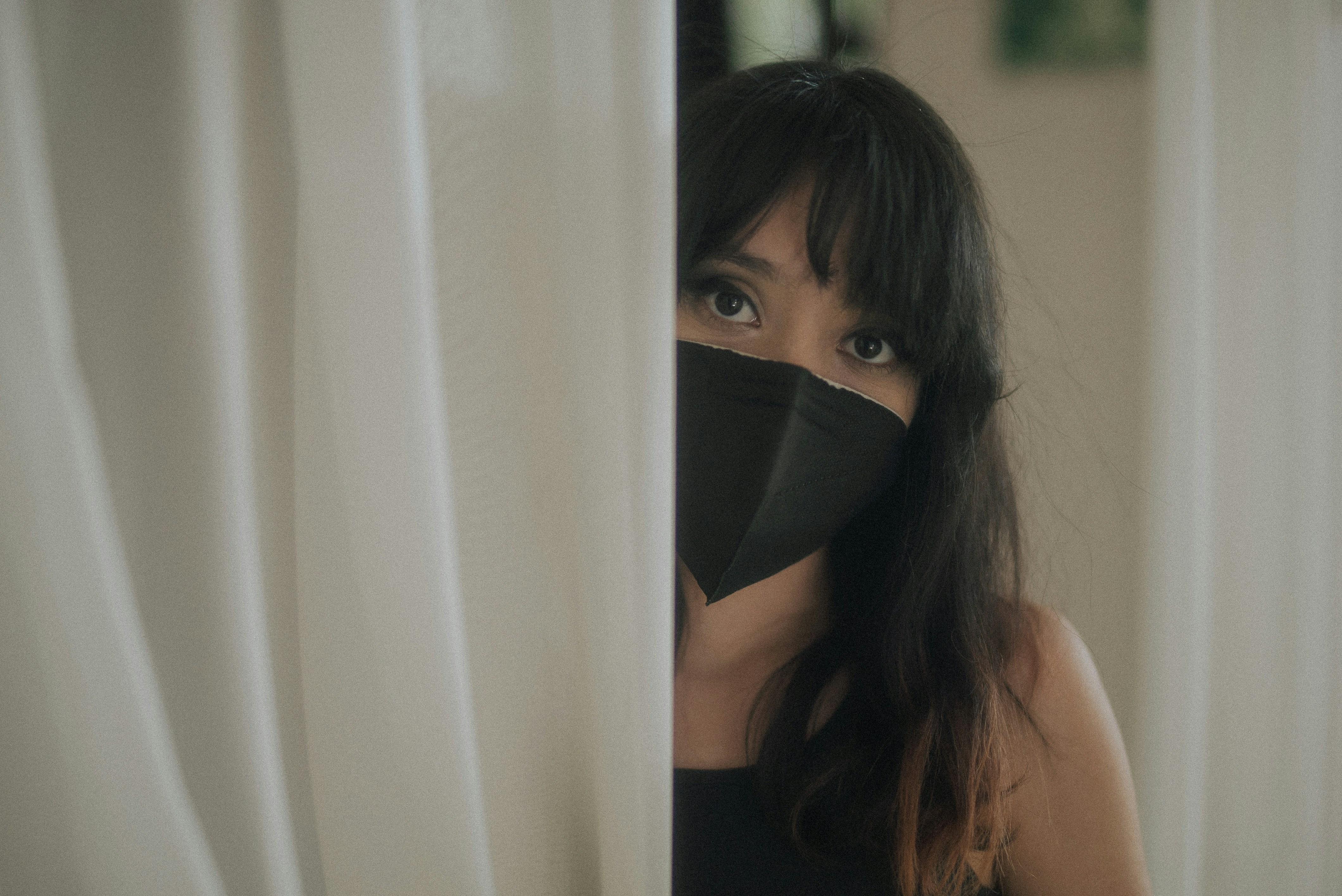 Veiled Gaze: A Closer Look Through the Curtain