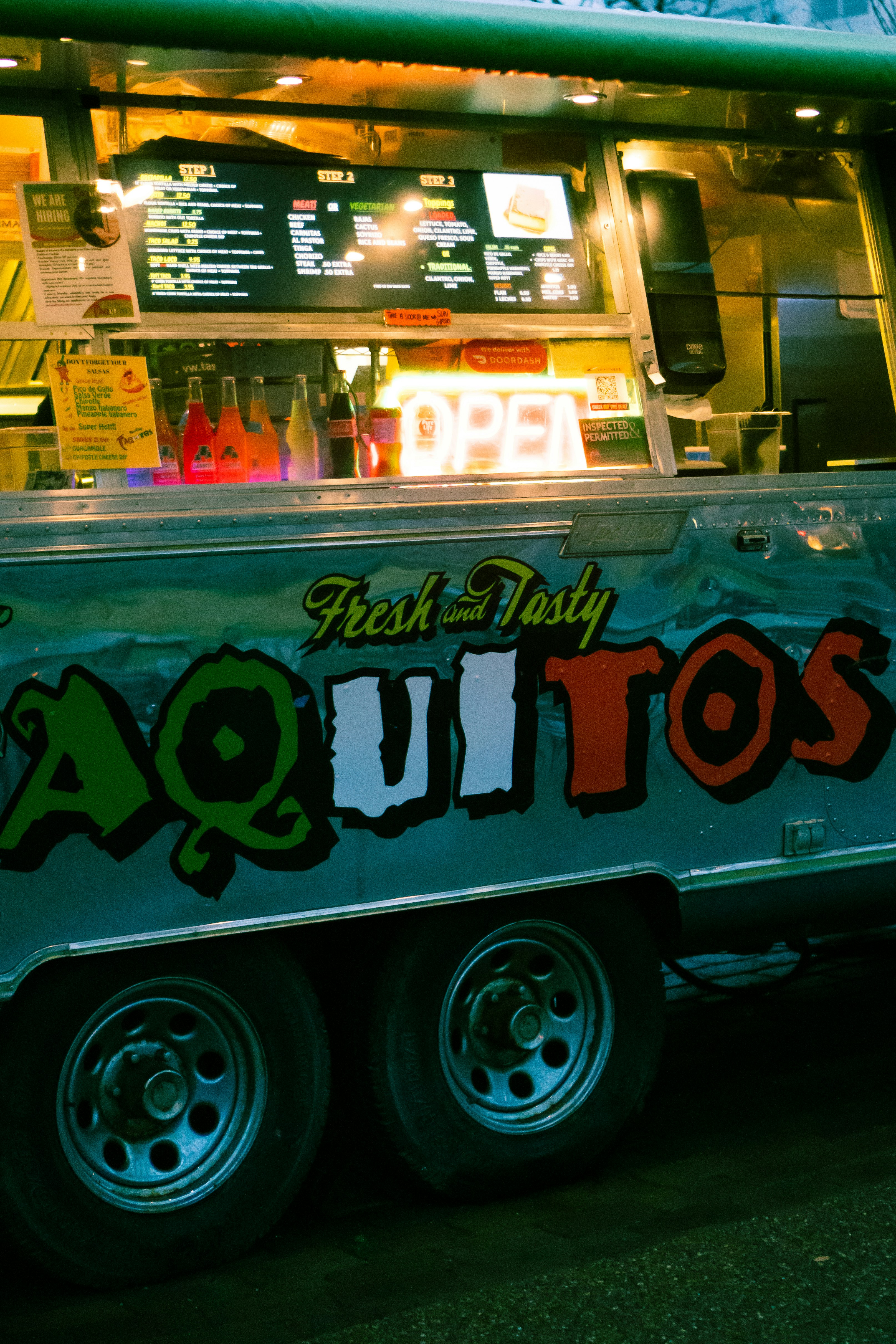 AQUITOS Night Food Truck: Neon OPEN Glow Over Bold Painted Letters