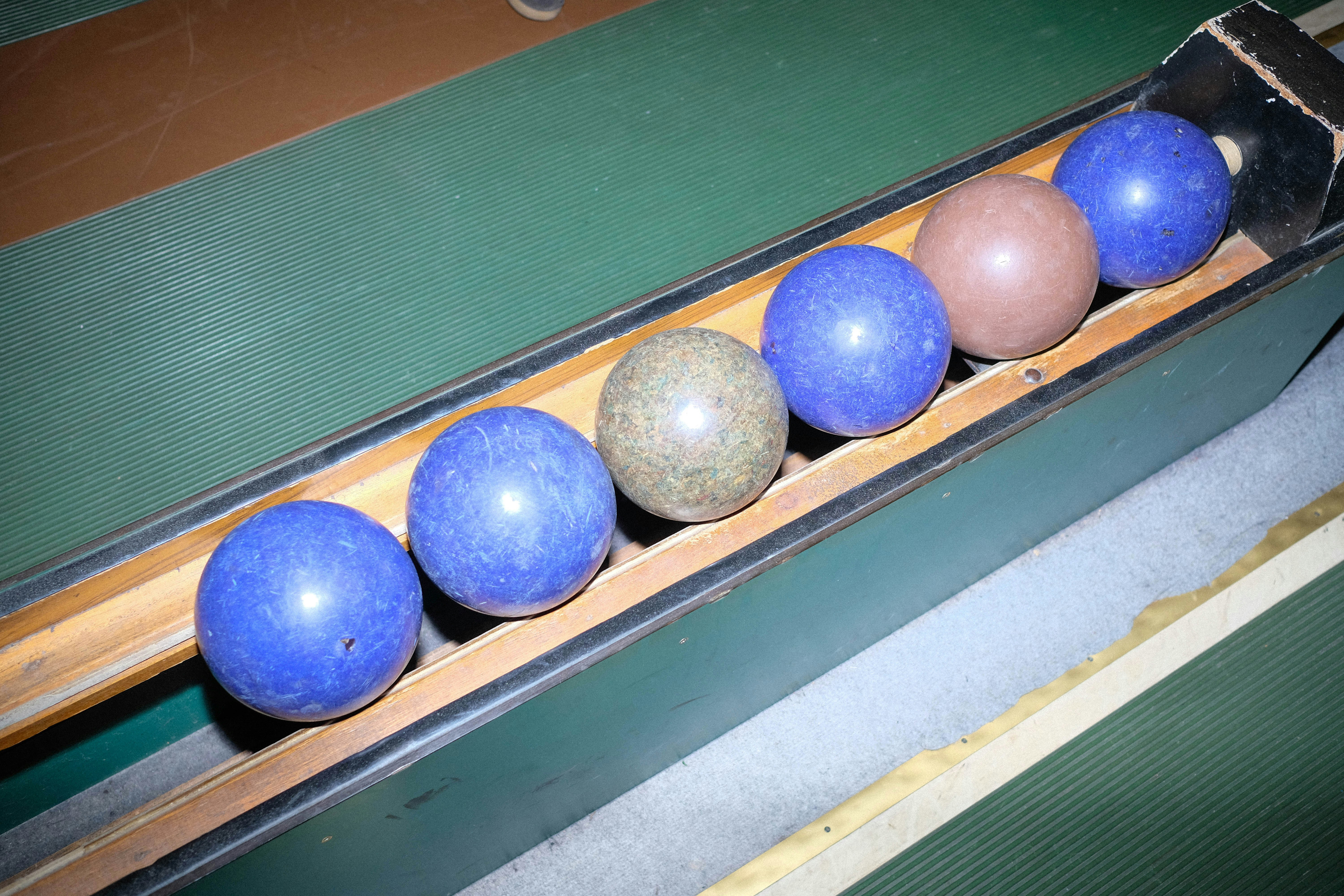 Blue Billiard Row on a Tilted Pool Table Channel