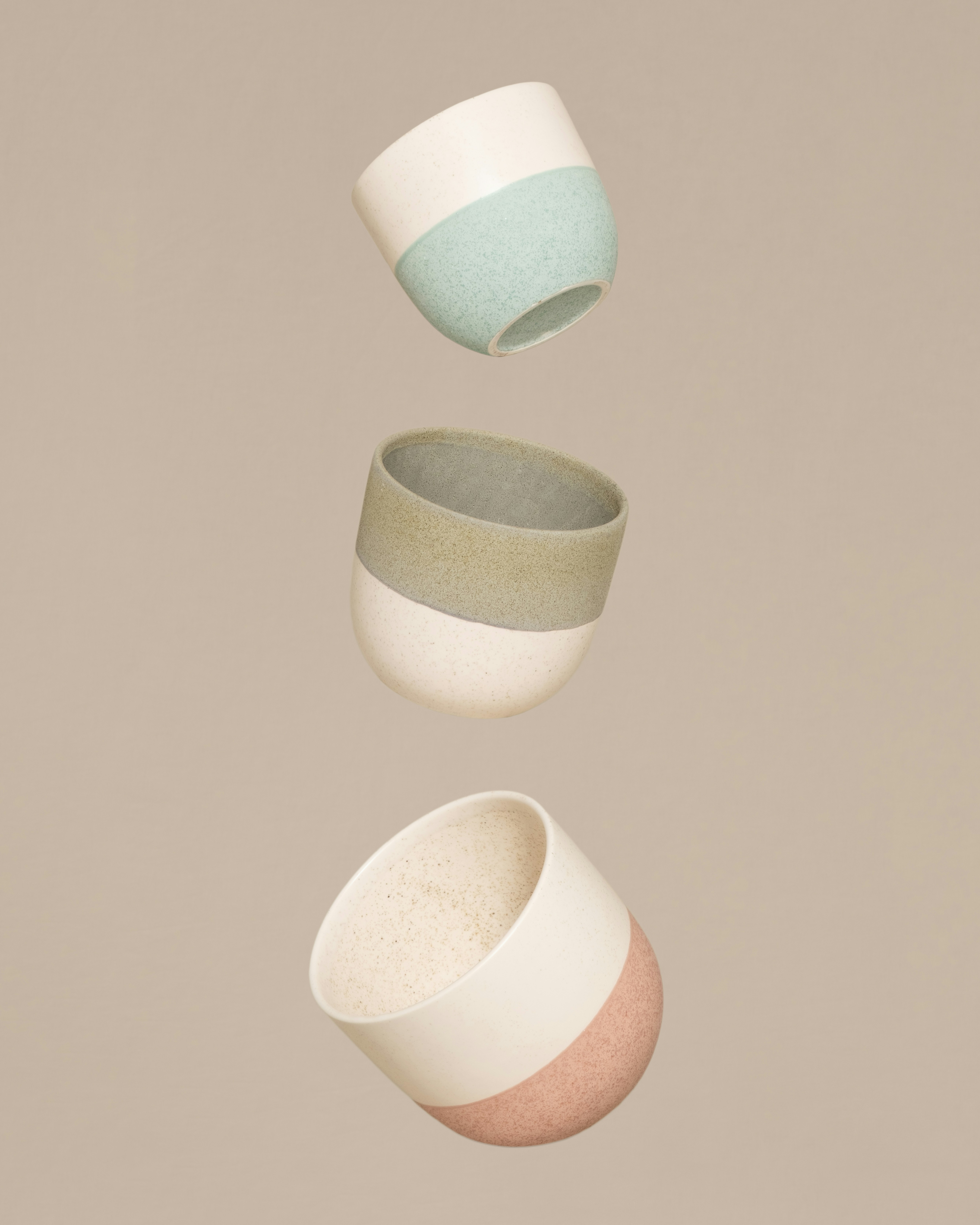 A group of three cups flying through the air photo – Free Simple Image ...