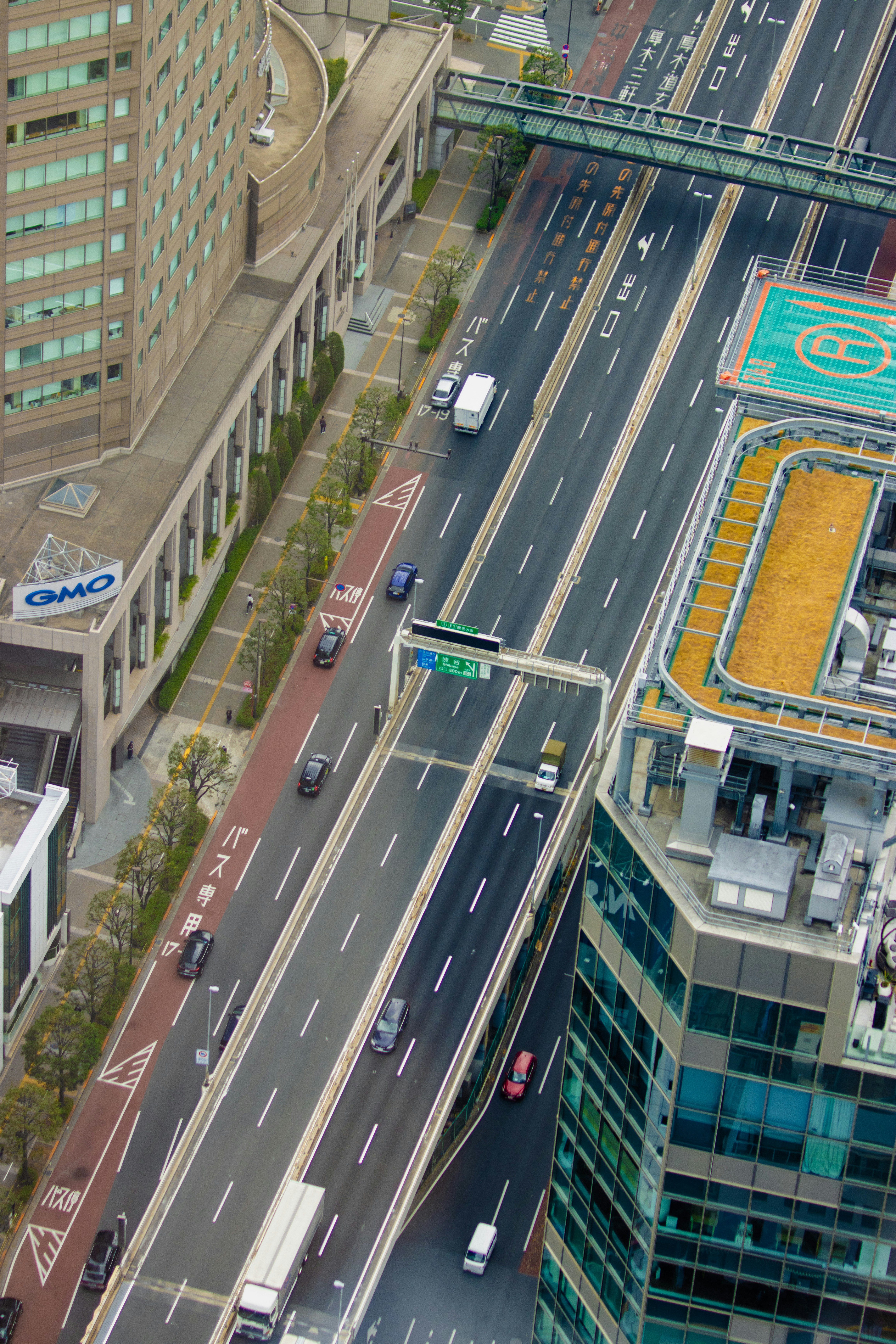 Urban Ribbon: Aerial Snapshot of a City Highway Between Skyscrapers