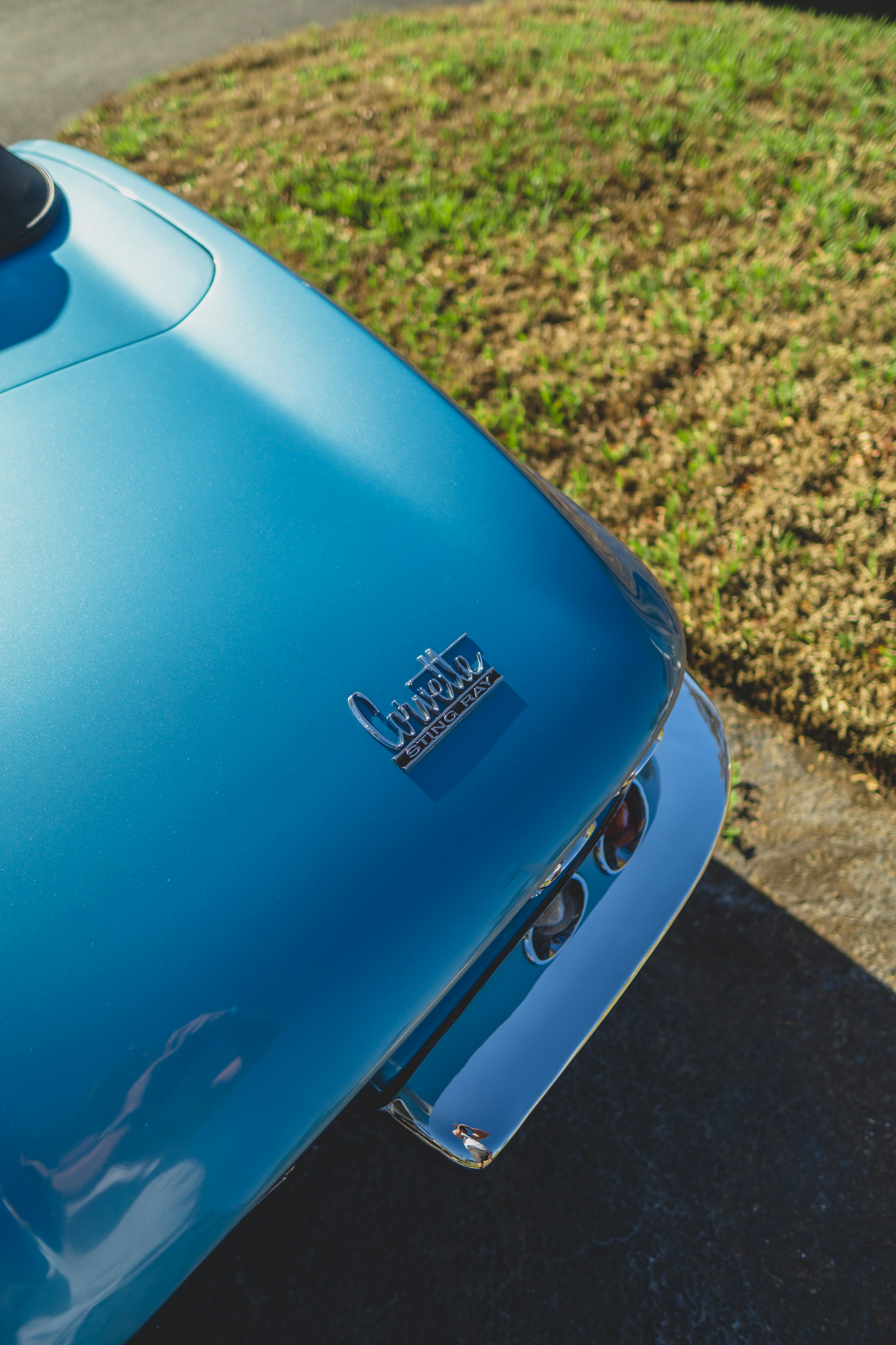 A close up of the hood of a blue car photo – Free Classic car Image on ...