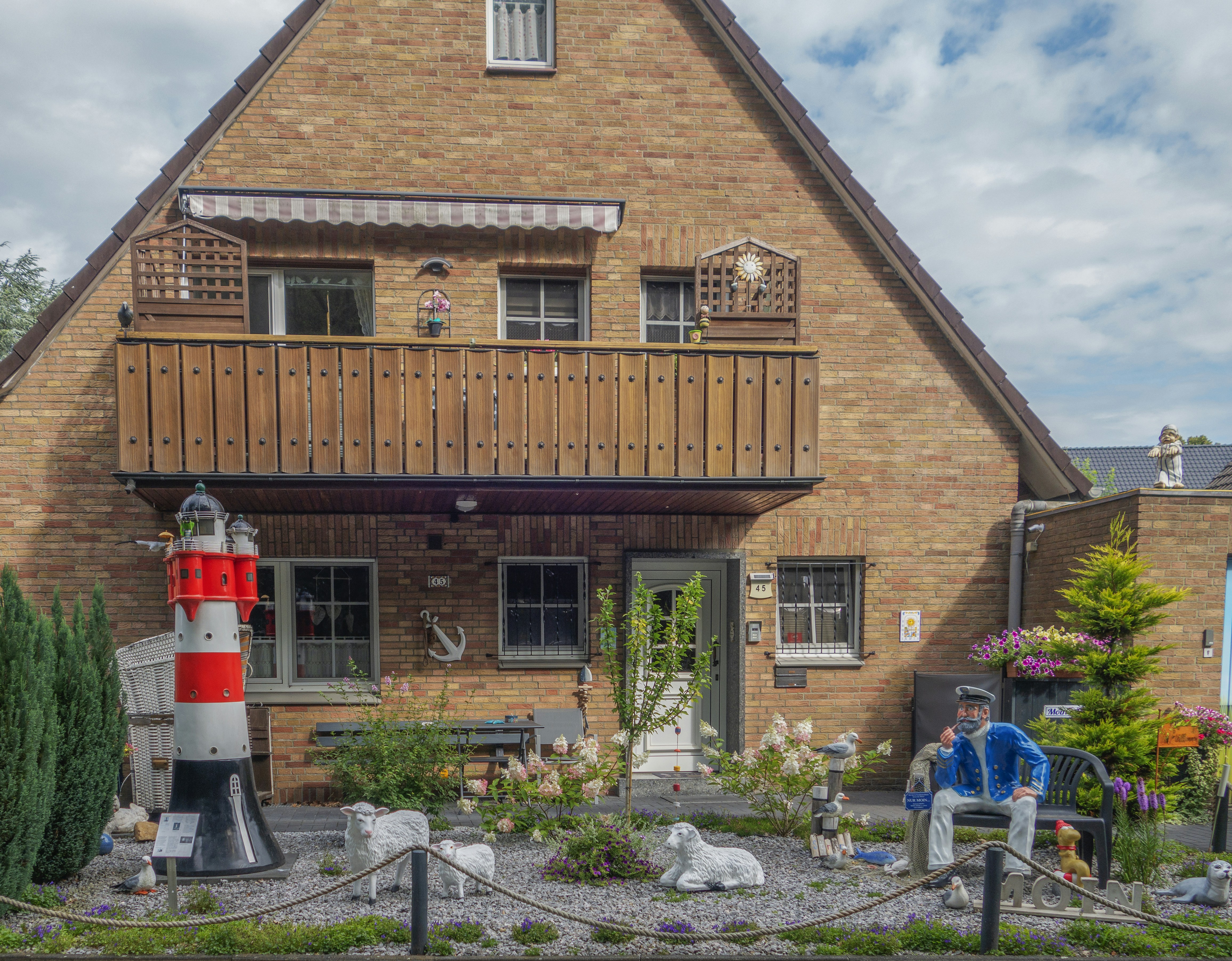 Whimsical Garden with Lighthouse Charm