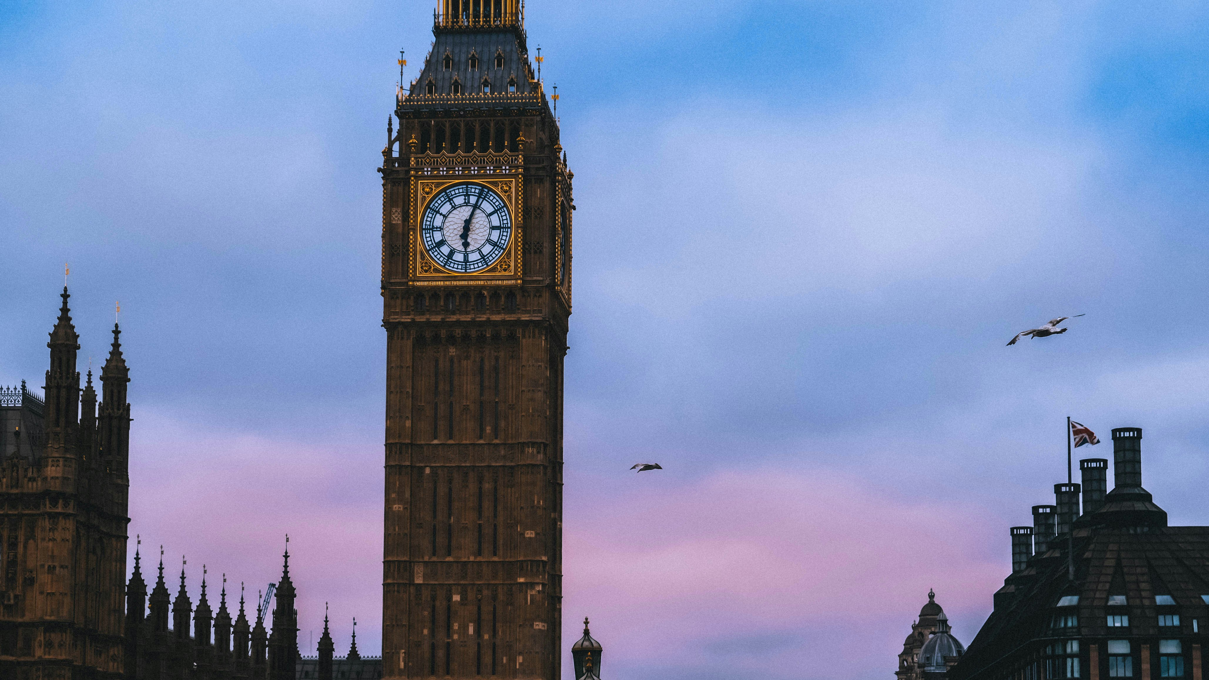 A large clock tower towering over a city photo – Free Big ben Image on ...