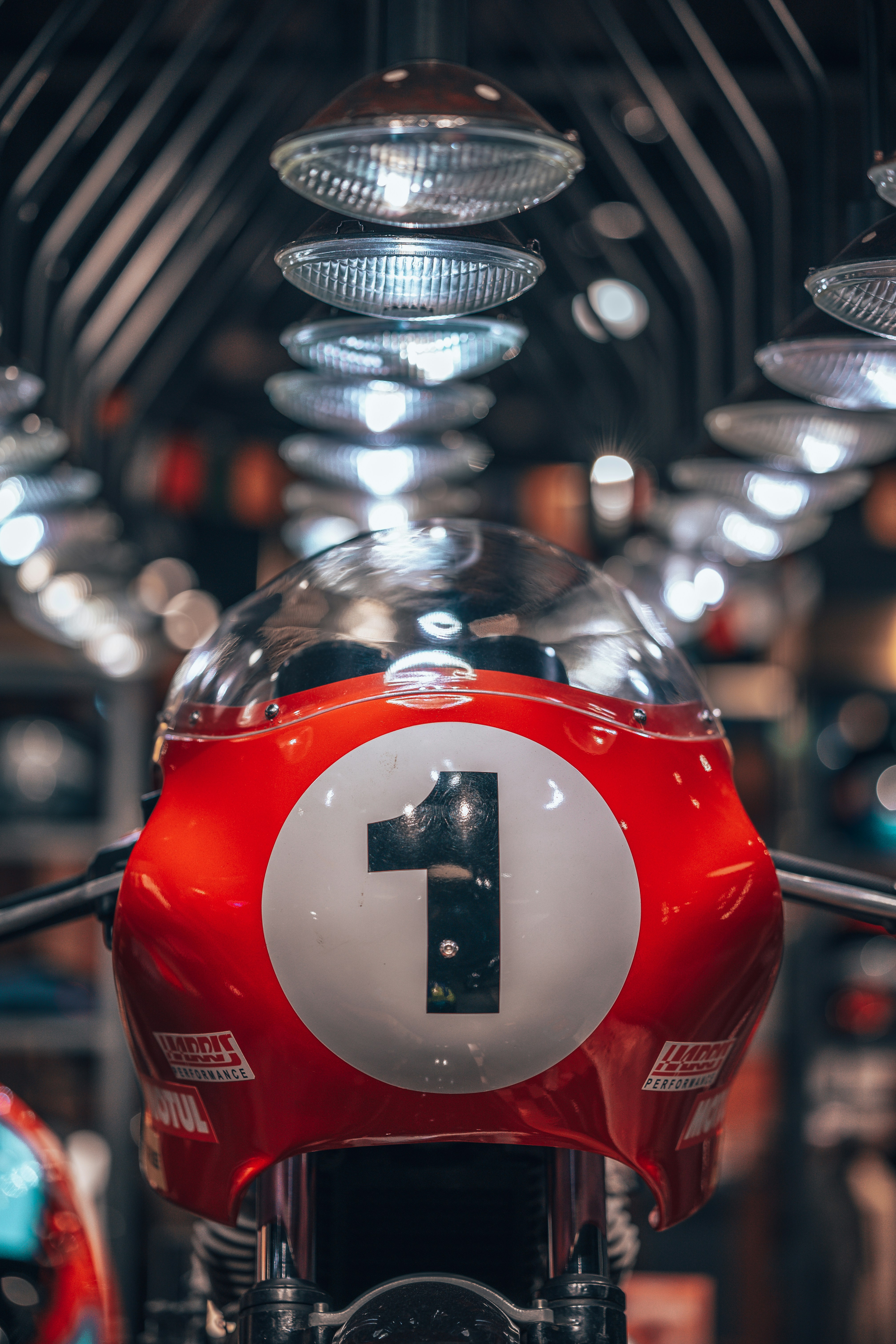 A red motorcycle with a number 1 on it photo – Free Gt 650 Image on ...