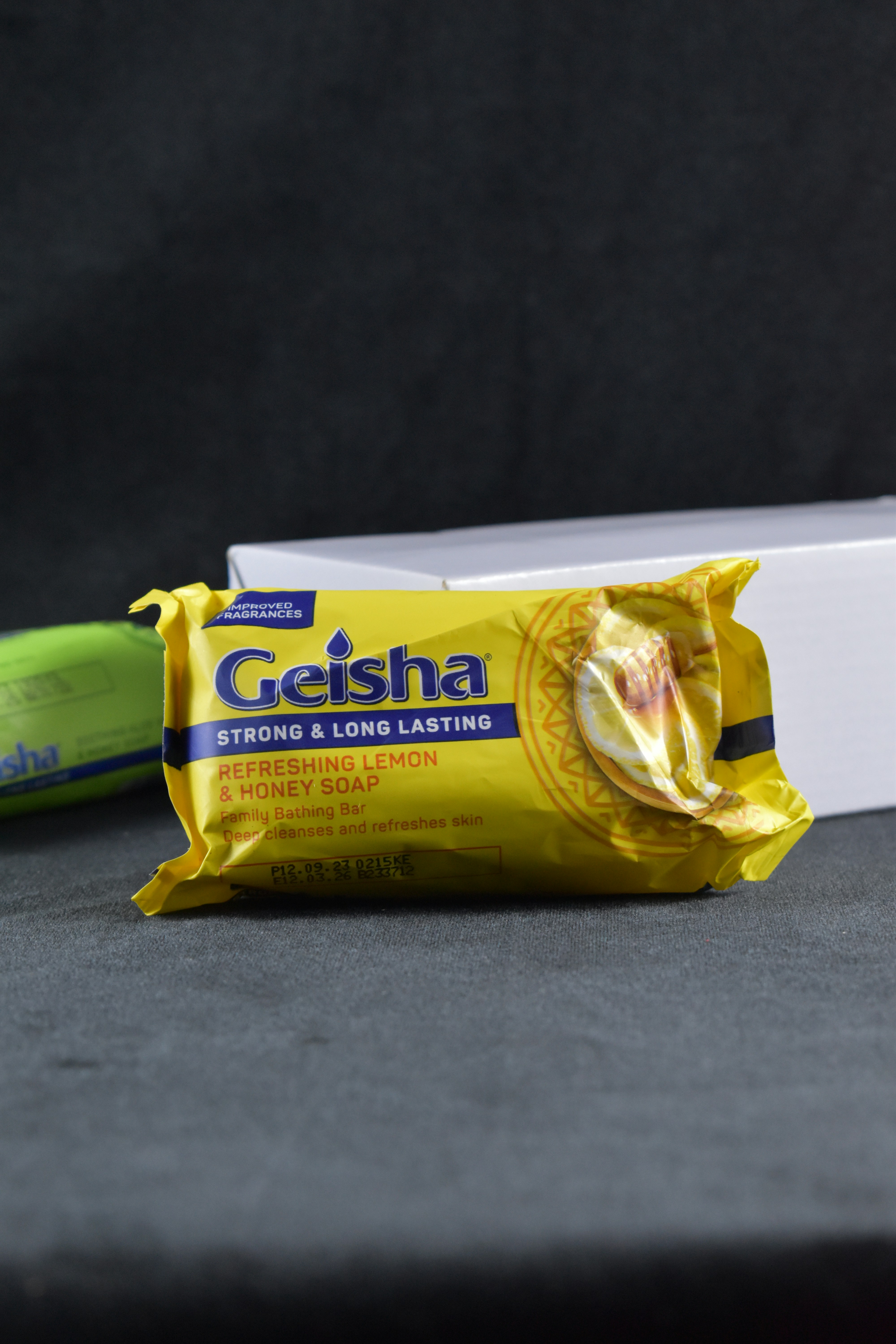 A bar of geisha sitting on a table next to a knife photo – Free Food ...