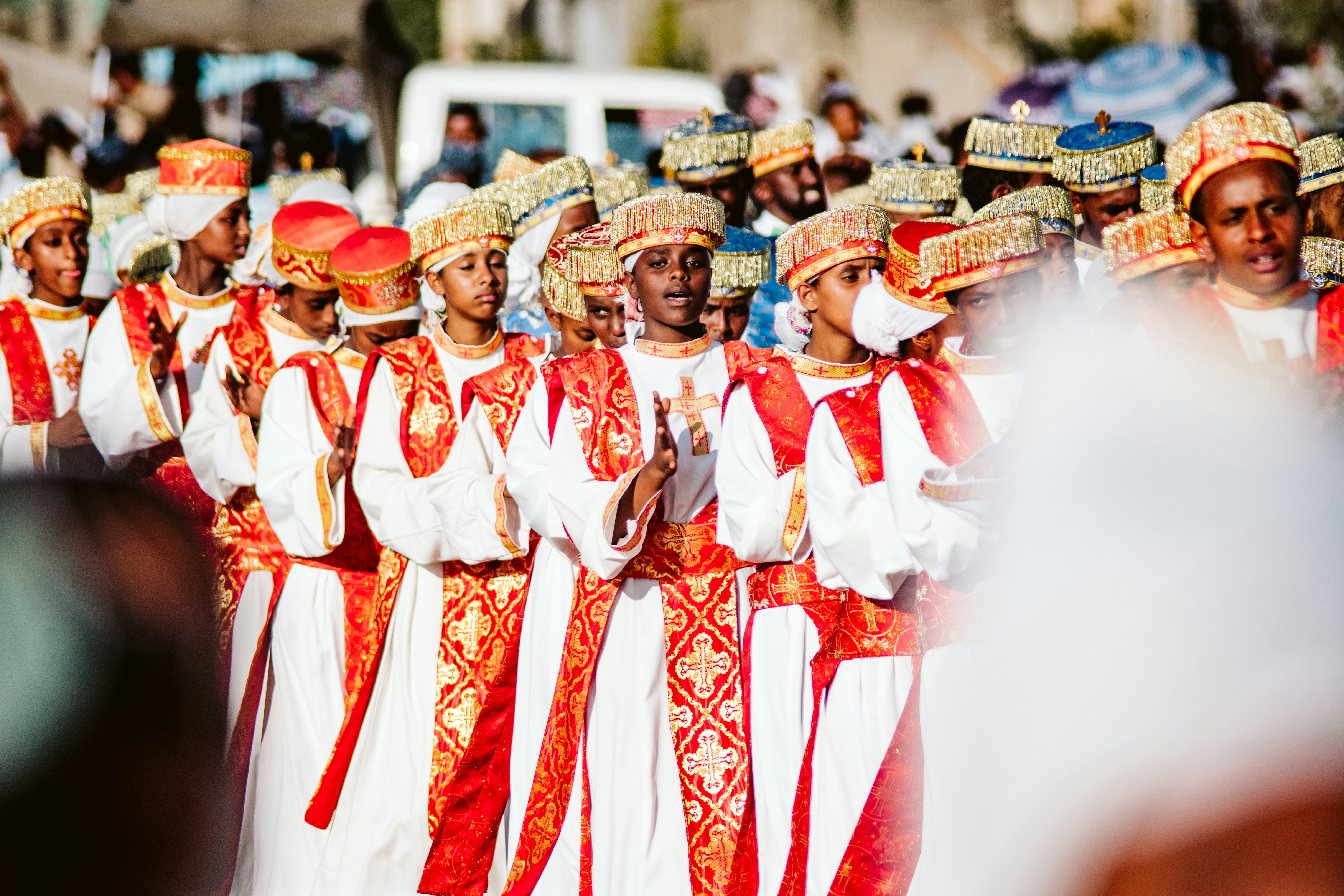 A group of people standing next to each other photo – Free Woman Image ...
