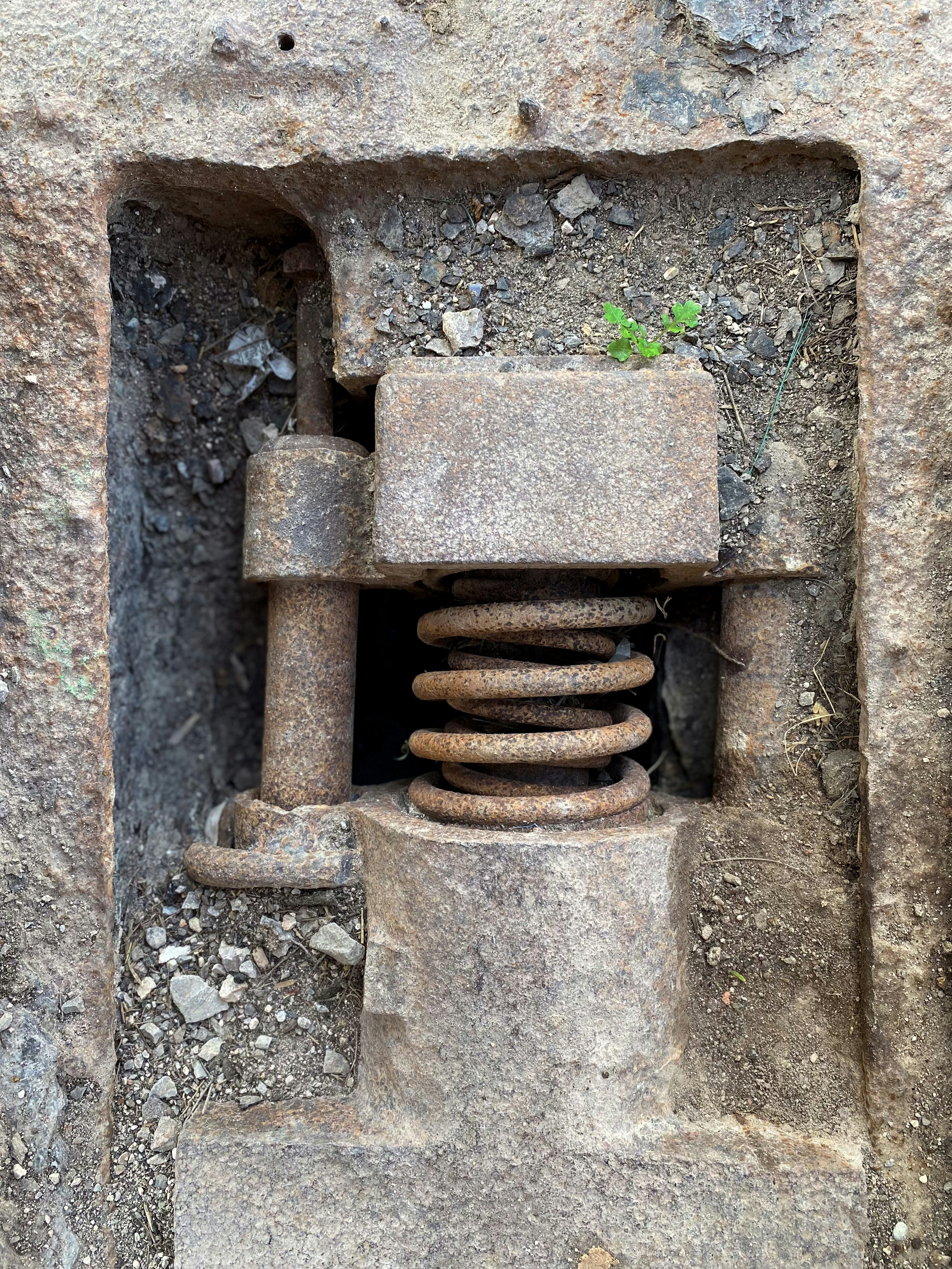 Rusty Subterranean Spring: A Hidden Mechanical Moment