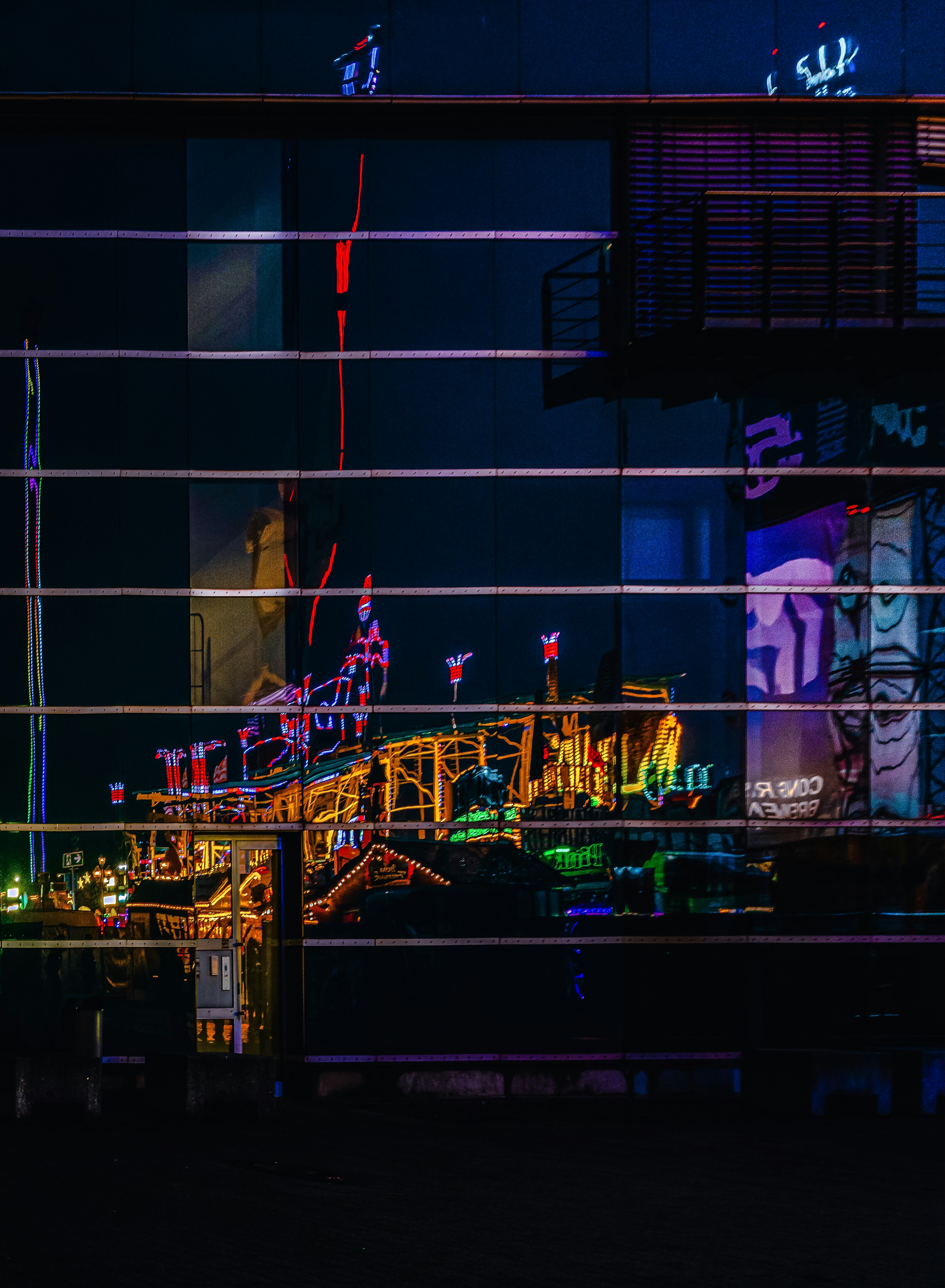 A reflection of a roller coaster in a window photo – Free Bremen Image ...