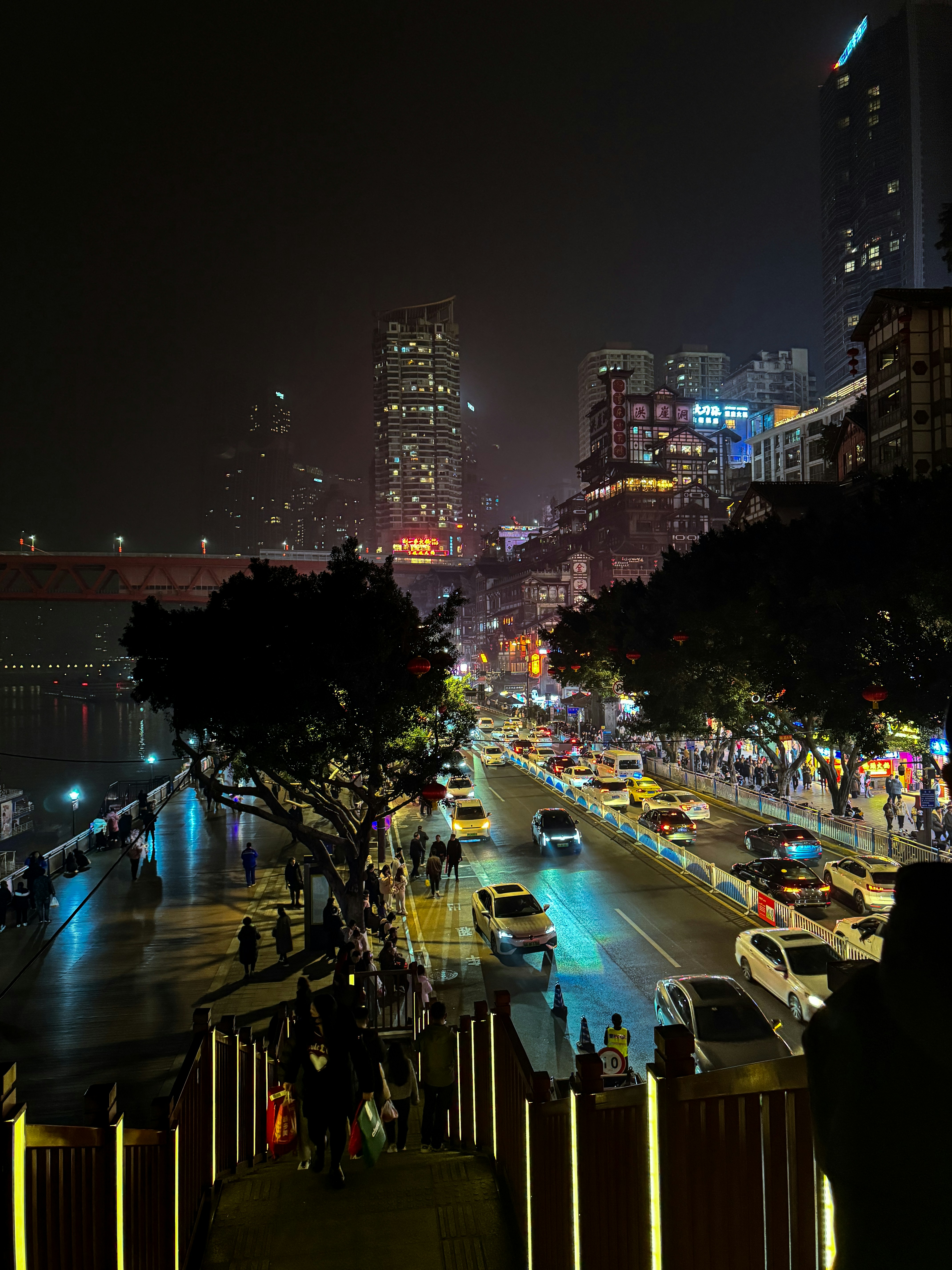 Neon Riverfront: Nightlife Along the City Steps