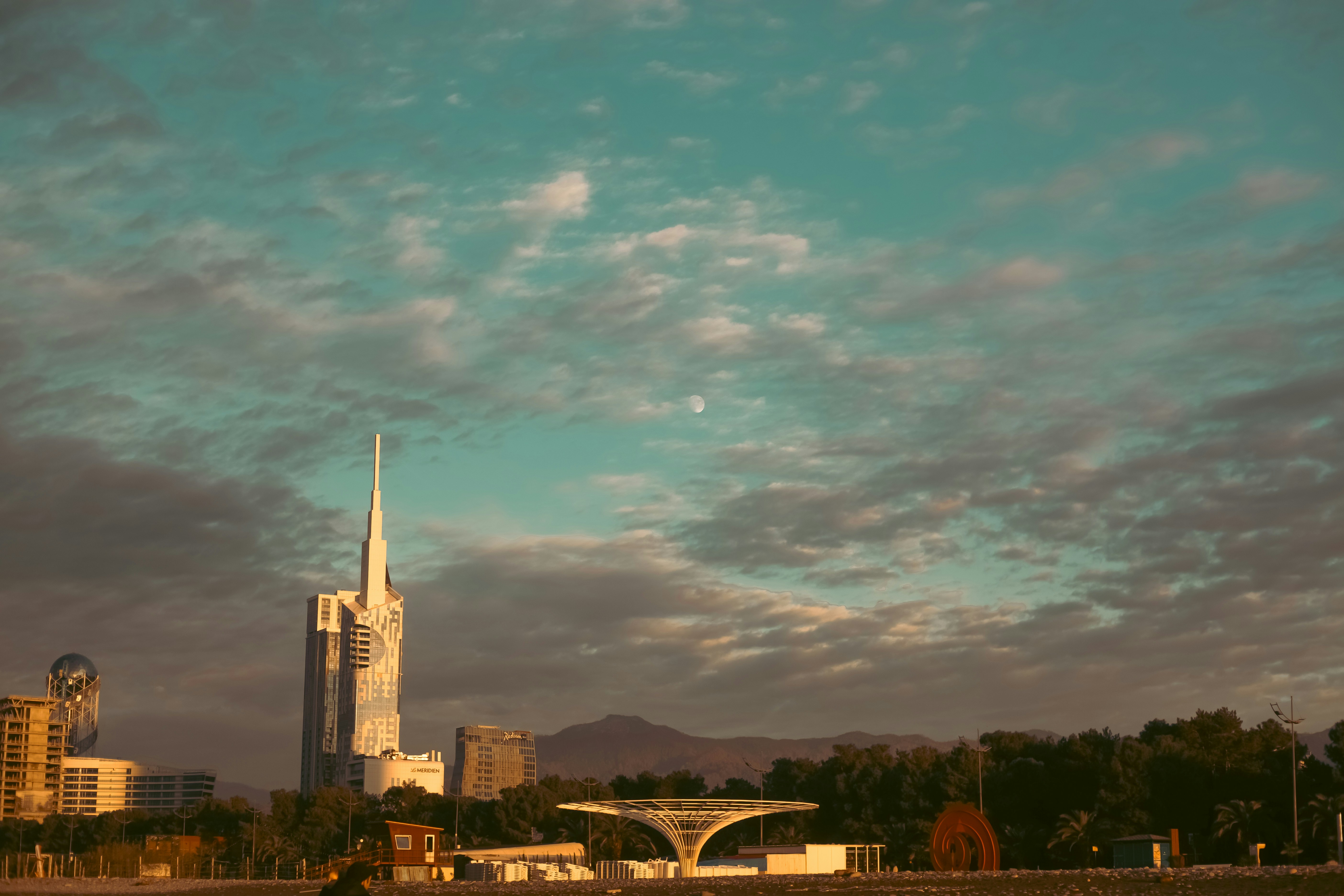 City Skyline under a Quiet Dusk with a Standout Tower