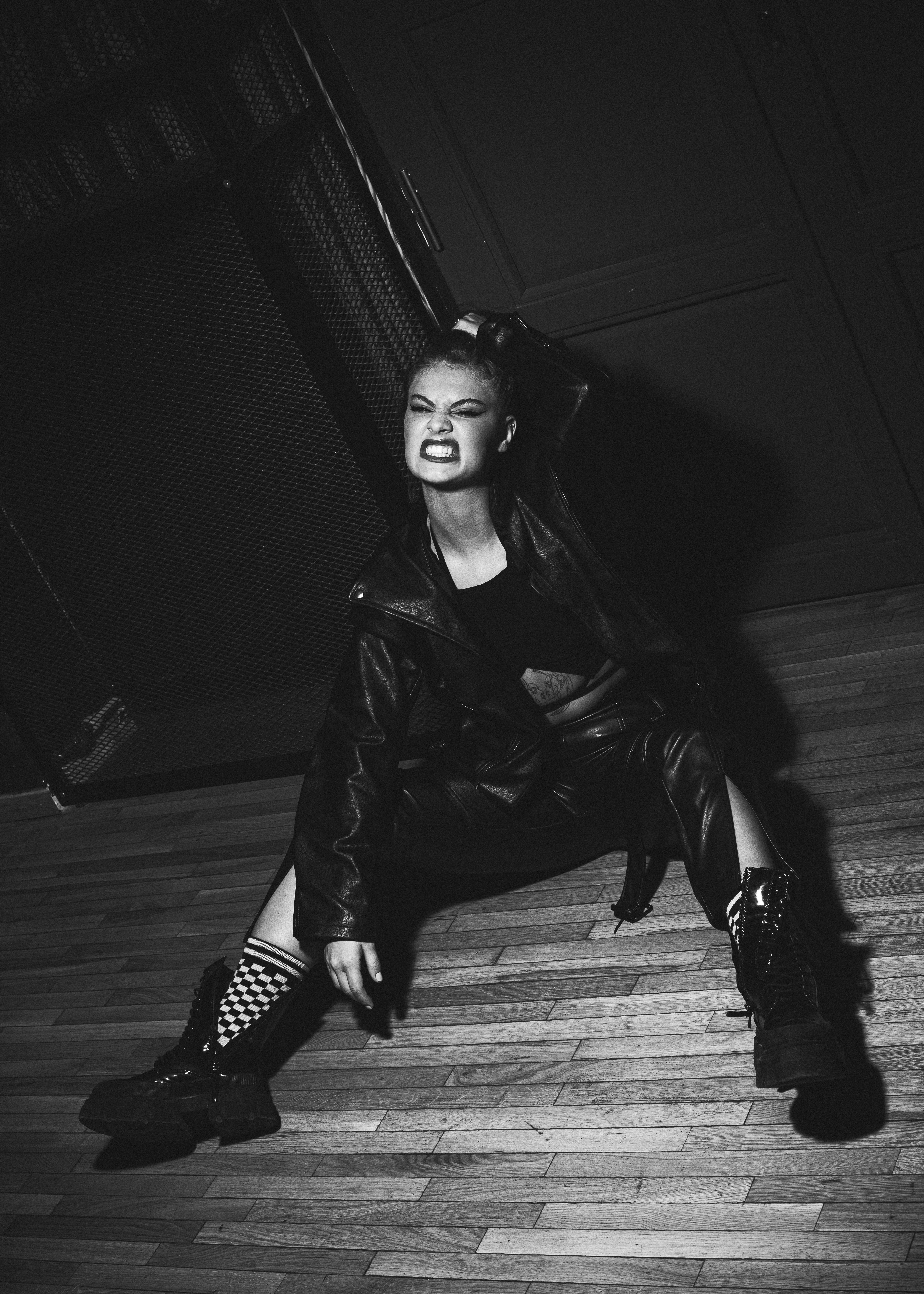 Midnight Rebel: A Gritty Portrait on a Quiet Stage