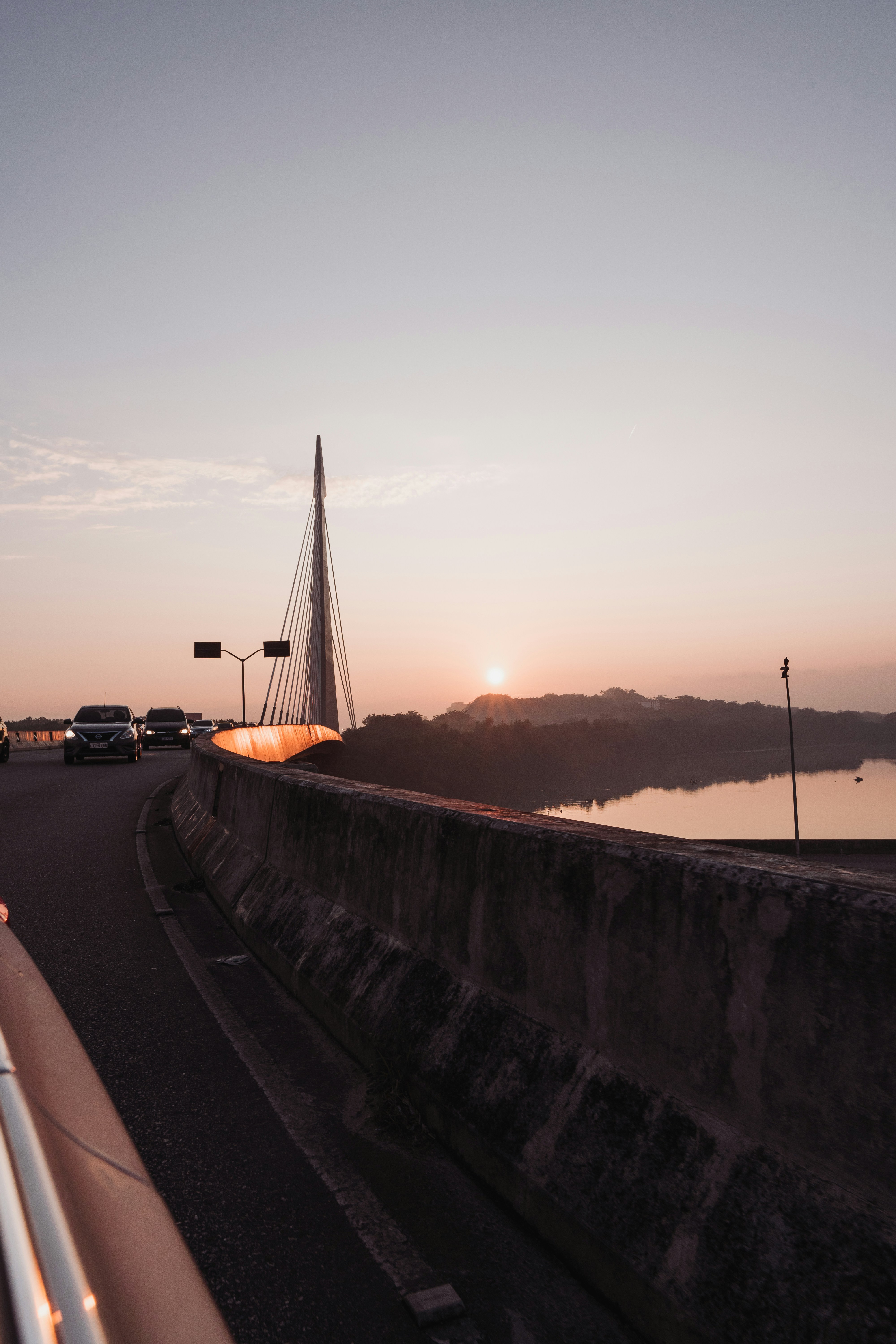 Dusk on a Cable-Stayed Bridge: Quiet Traffic Over the River