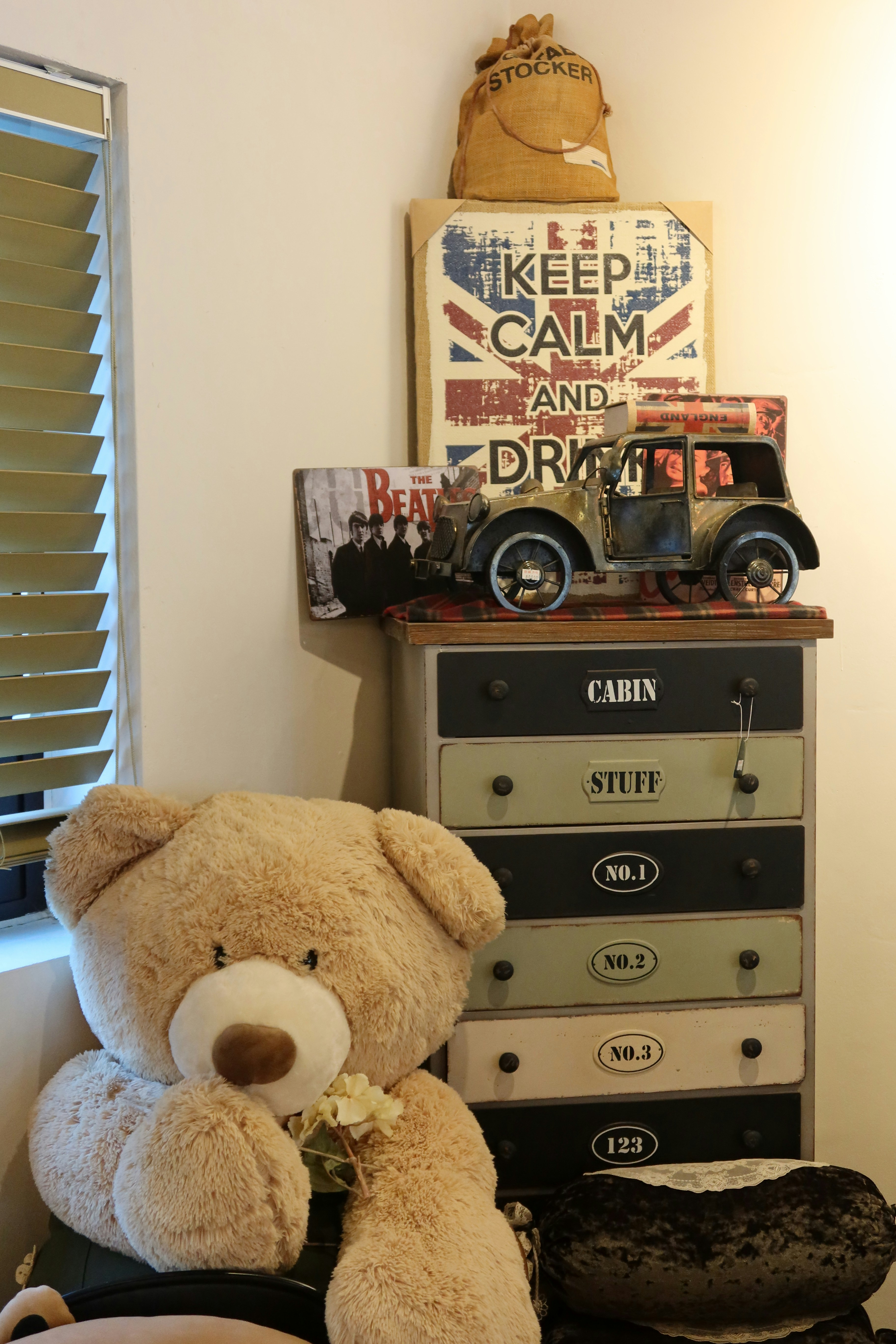 Cozy Corner Chronicle: Plush Bear, Vintage Toy Car, and Retro Decor