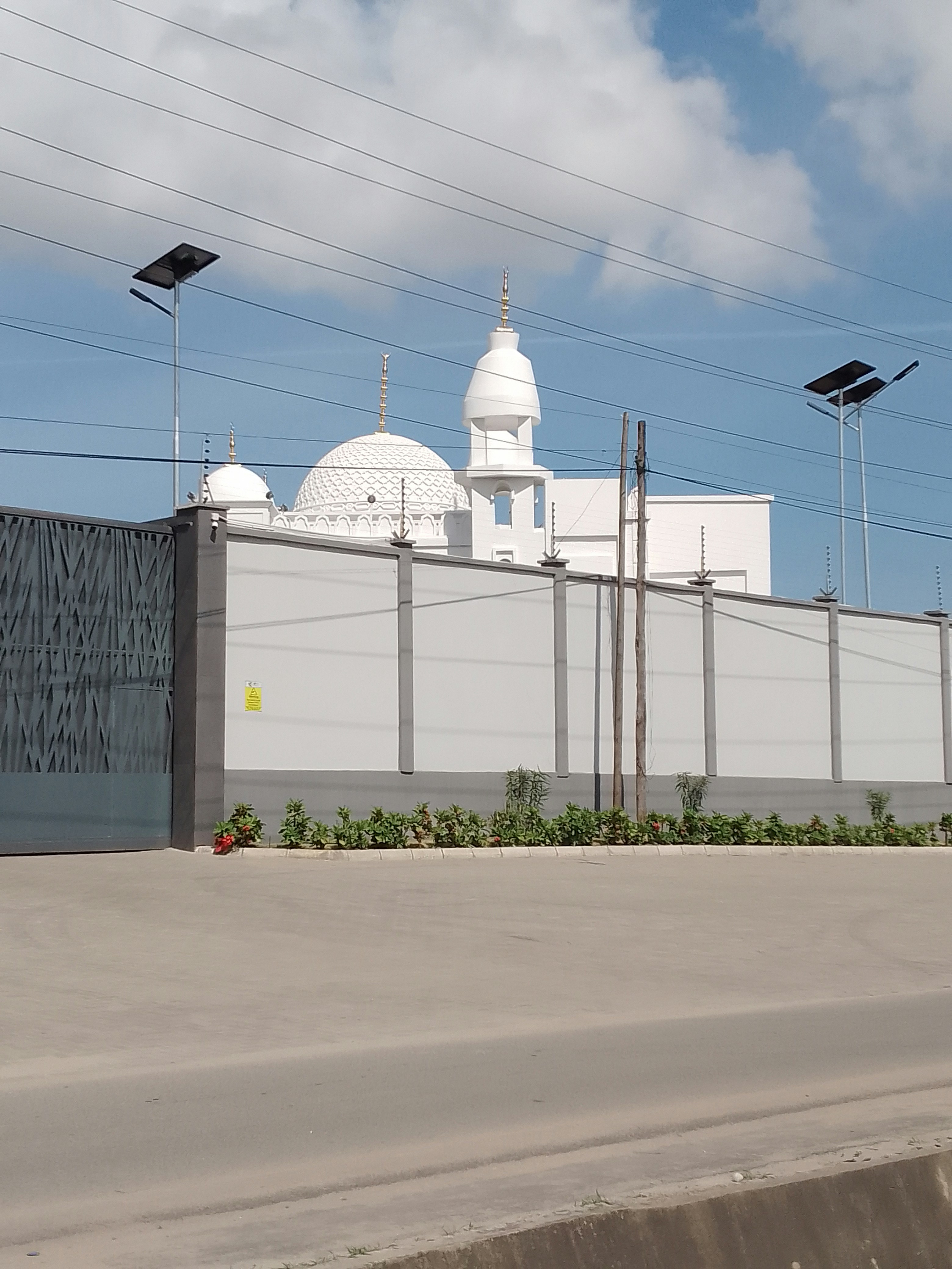 Domes Over the Wall: Quiet Street Portrait of a White Sanctuary