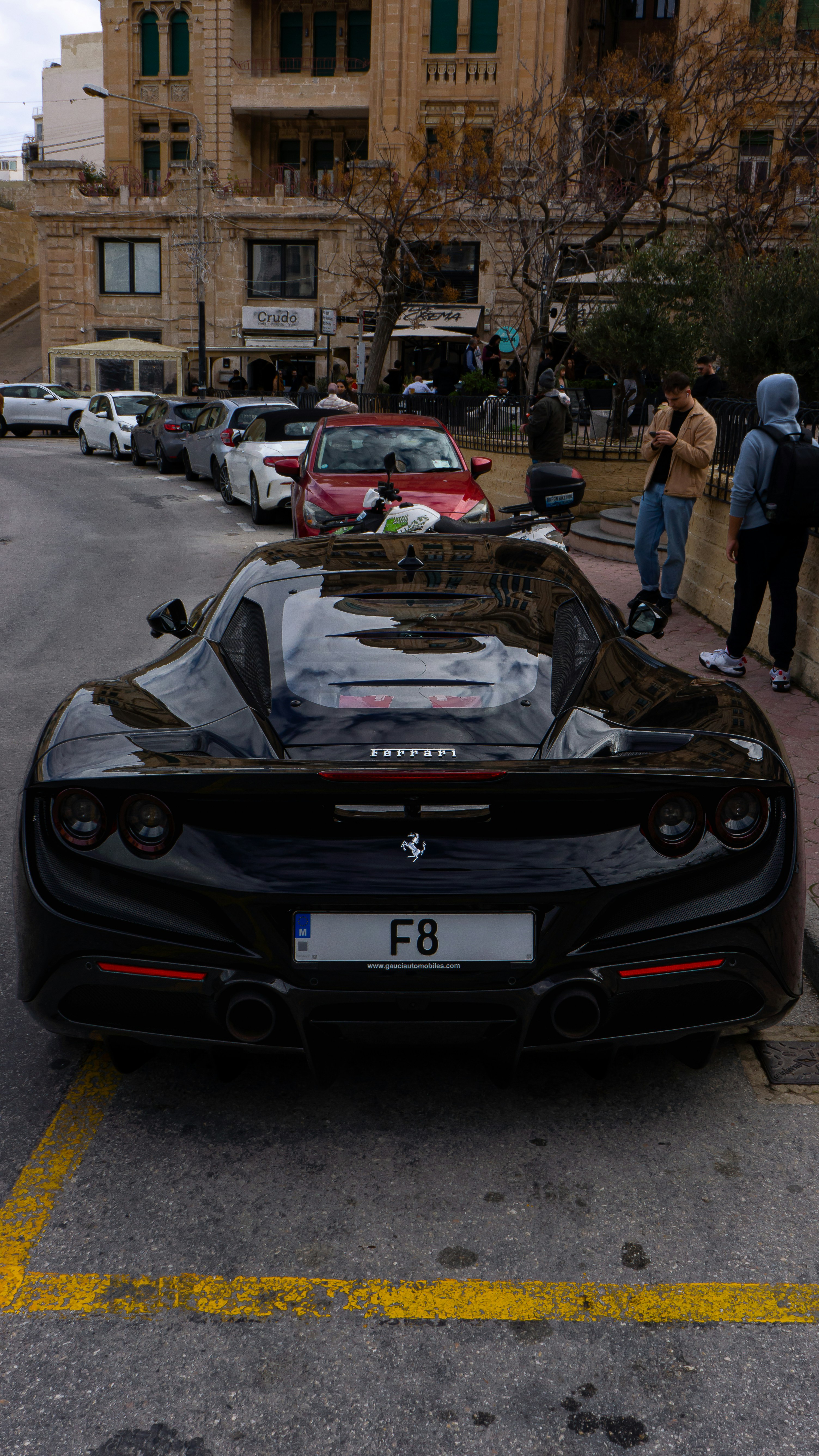 A black sports car parked on the side of the road photo – Free Malta ...