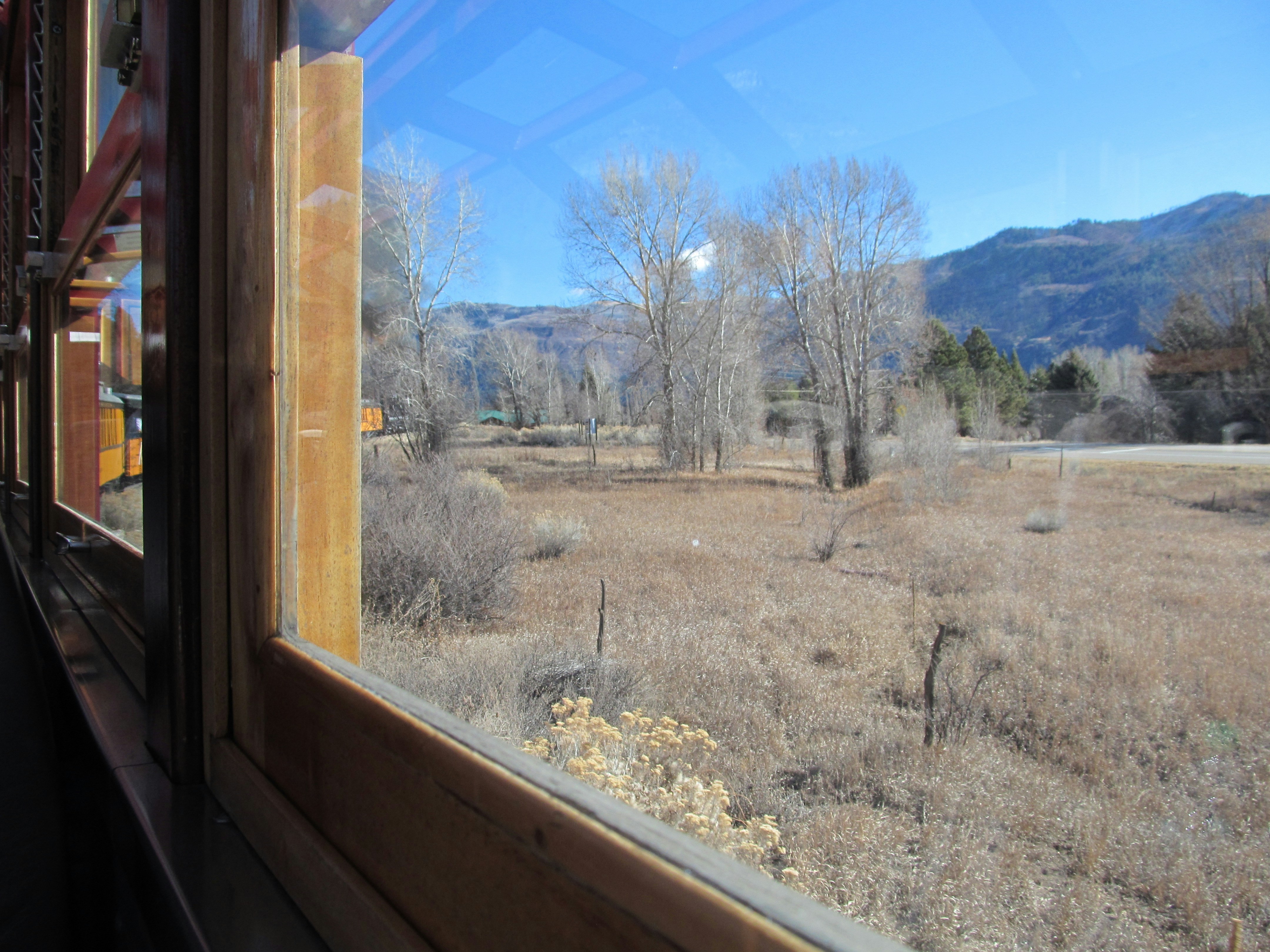 A view of a field from a window photo – Free Vegetation Image on Unsplash
