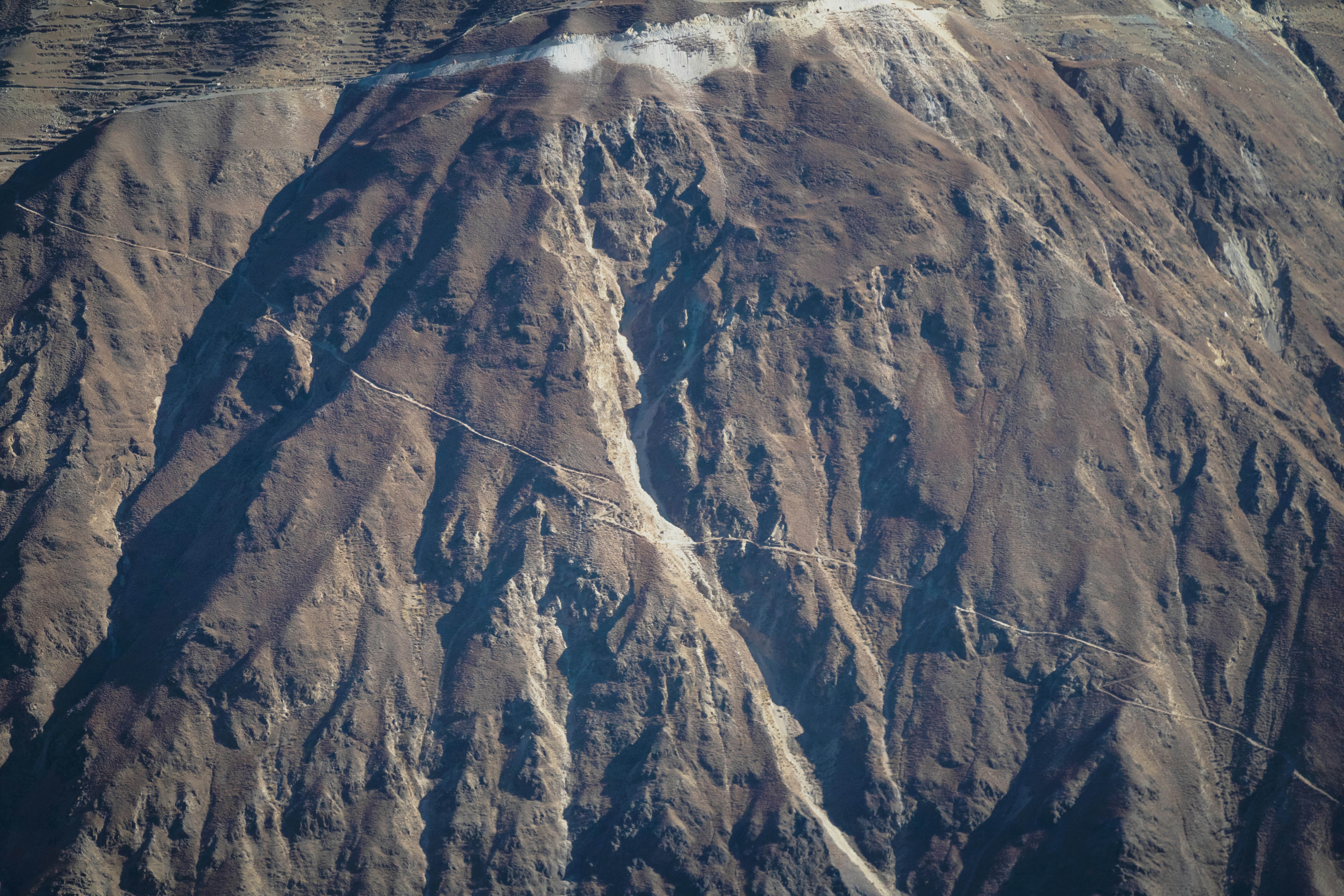 Ridgework at Dusk: Erosion Lines on a Canyon Face