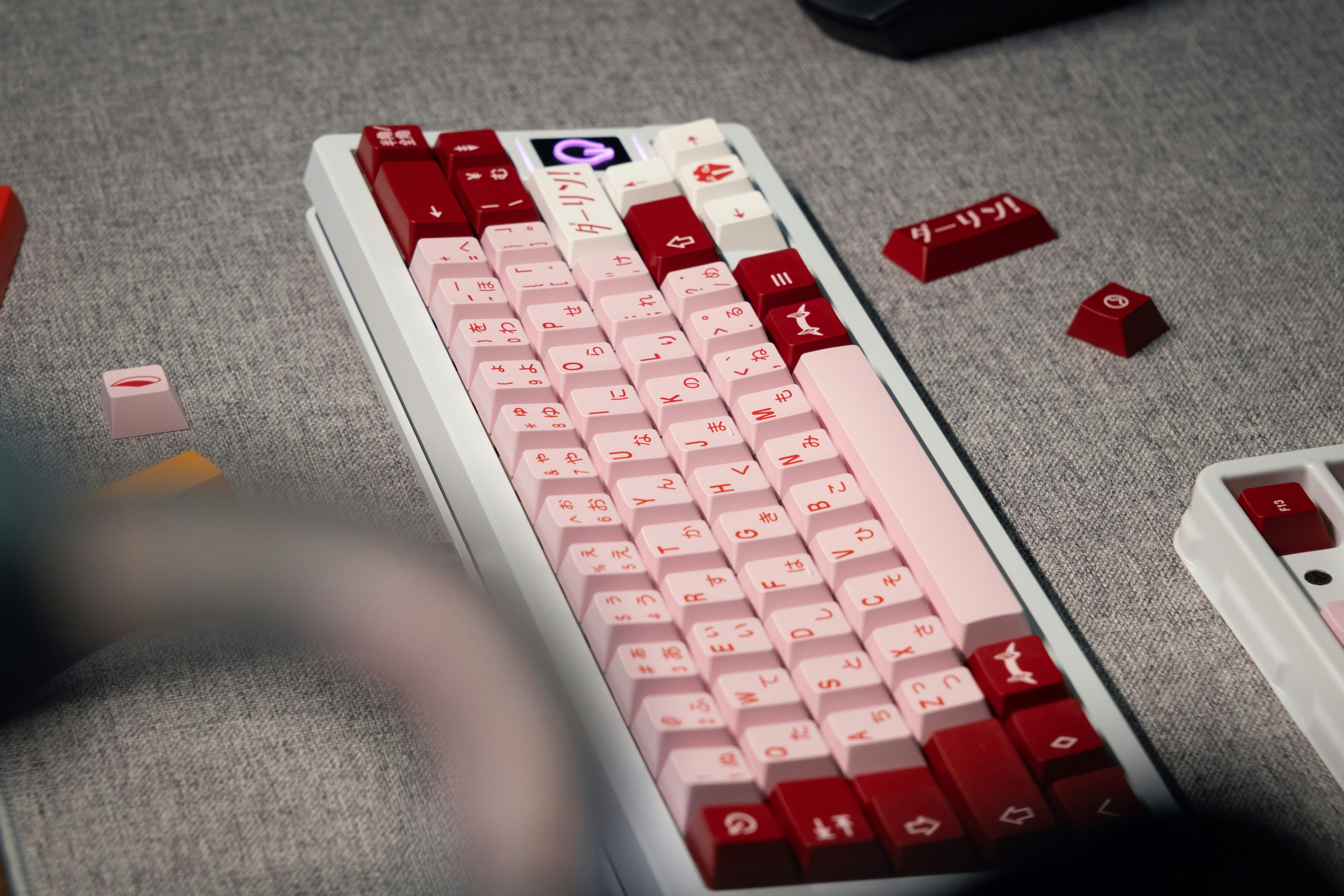A red and white keyboard sitting on top of a desk photo – Free ...