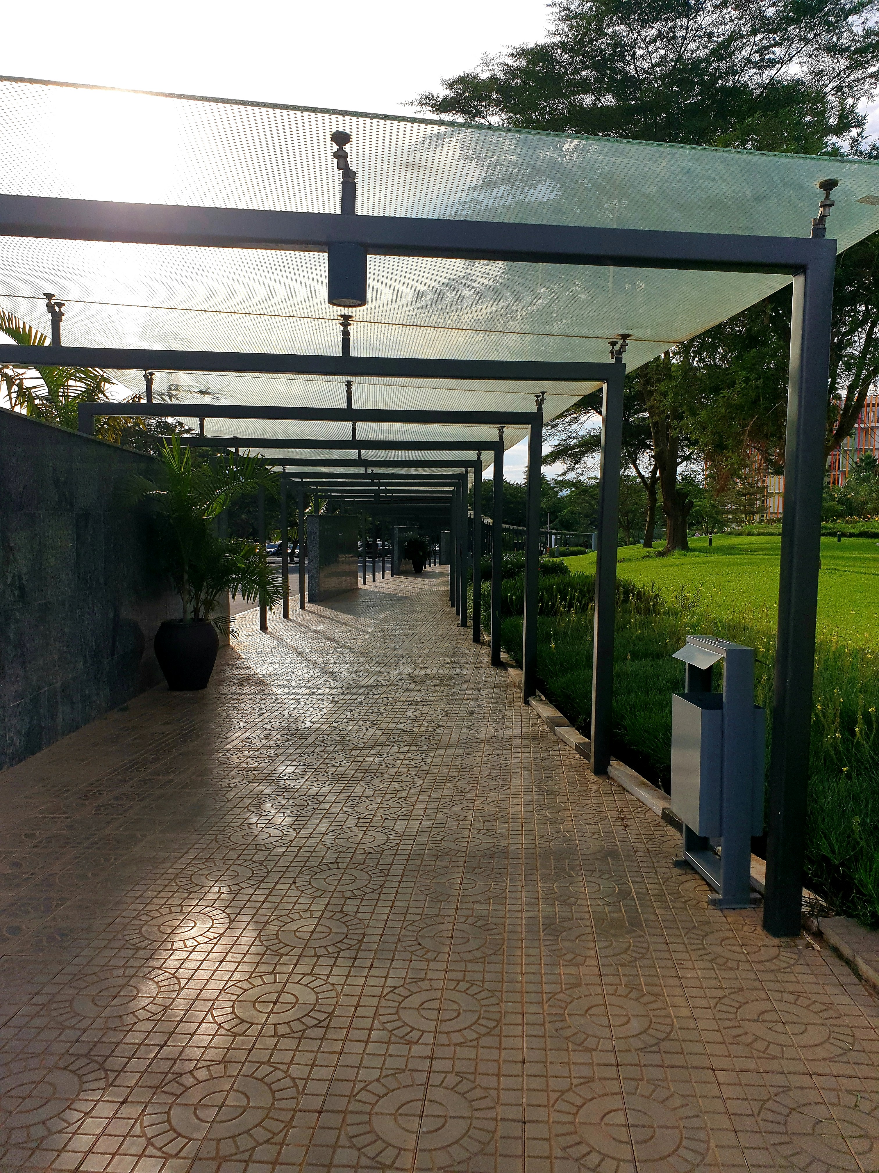 Shaded Corridor with Receding Glass Canopies