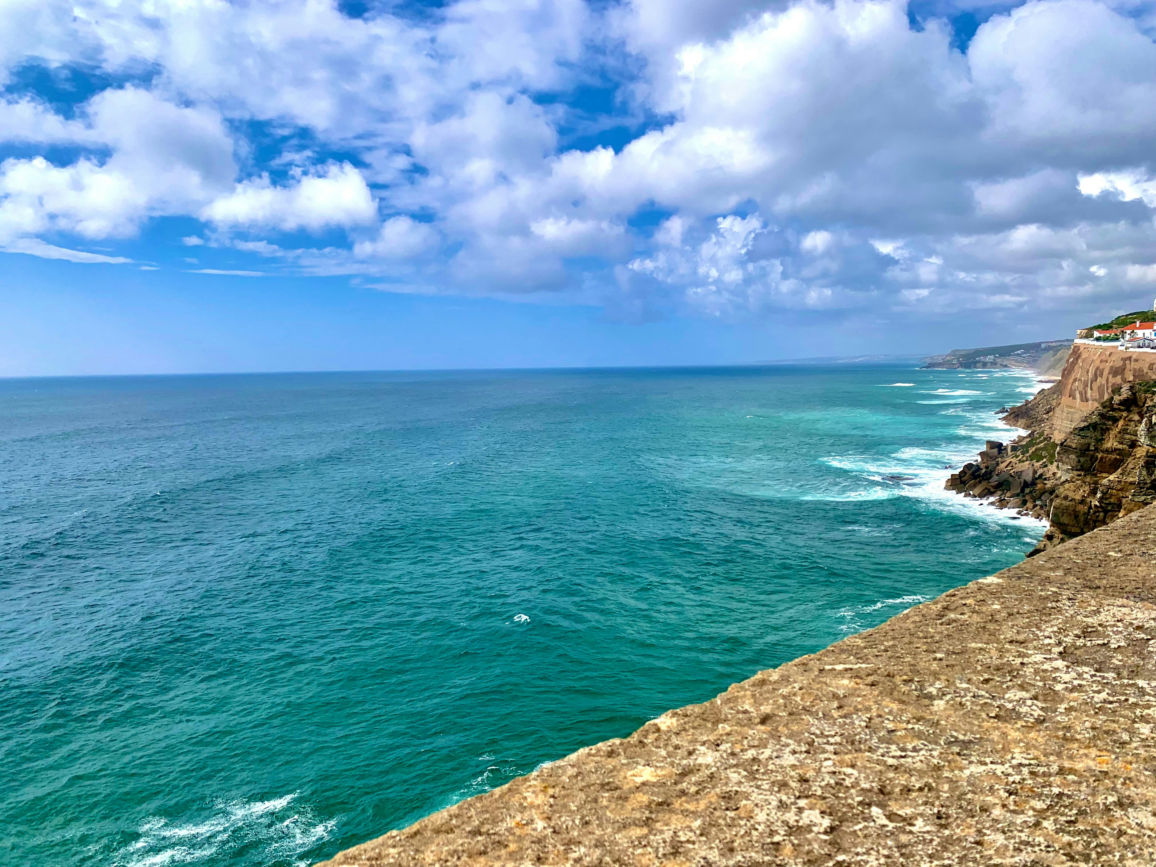 A view of the ocean from a cliff photo – Free Sky Image on Unsplash